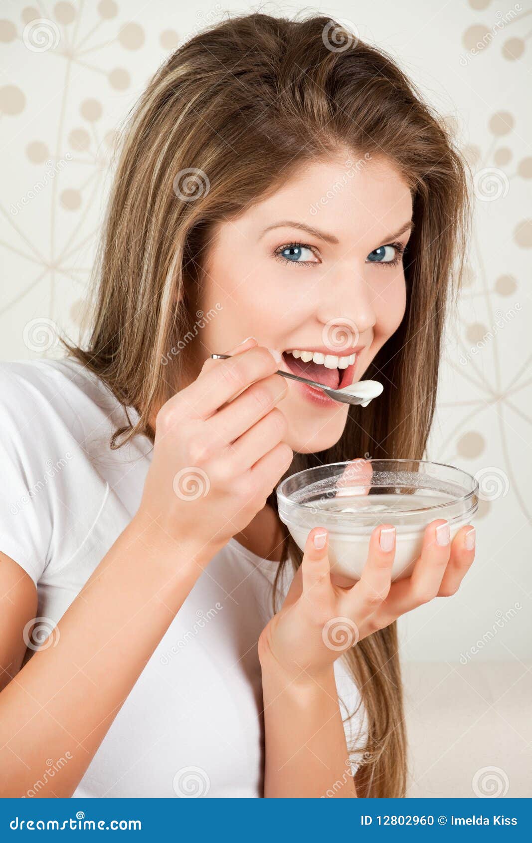Young Attractive Woman Eating Yogurt Stock Photo - Image of mild ...