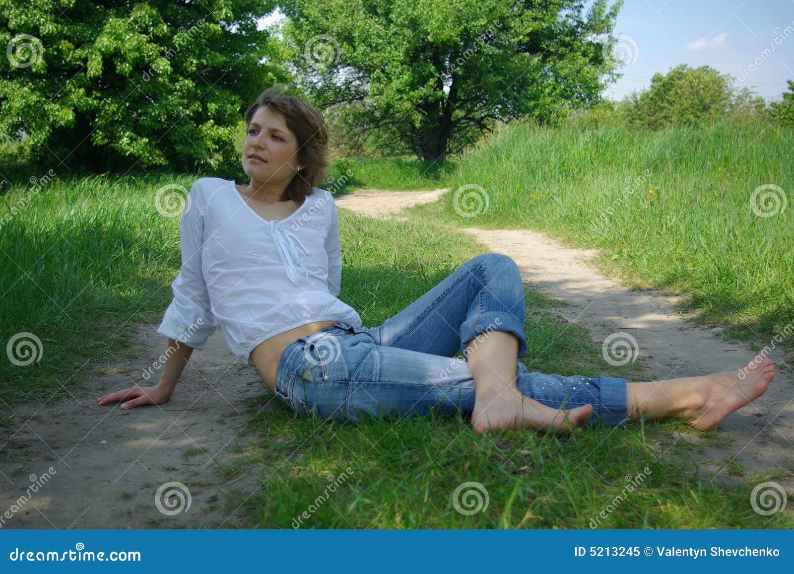 Young Attractive Woman Sitting in a Path Stock Image - Image of happy ...