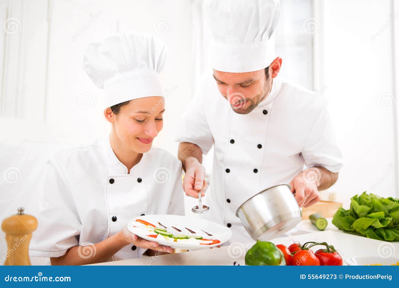 Young Attractives Professionals Chefs Cooking Together Stock Image ...