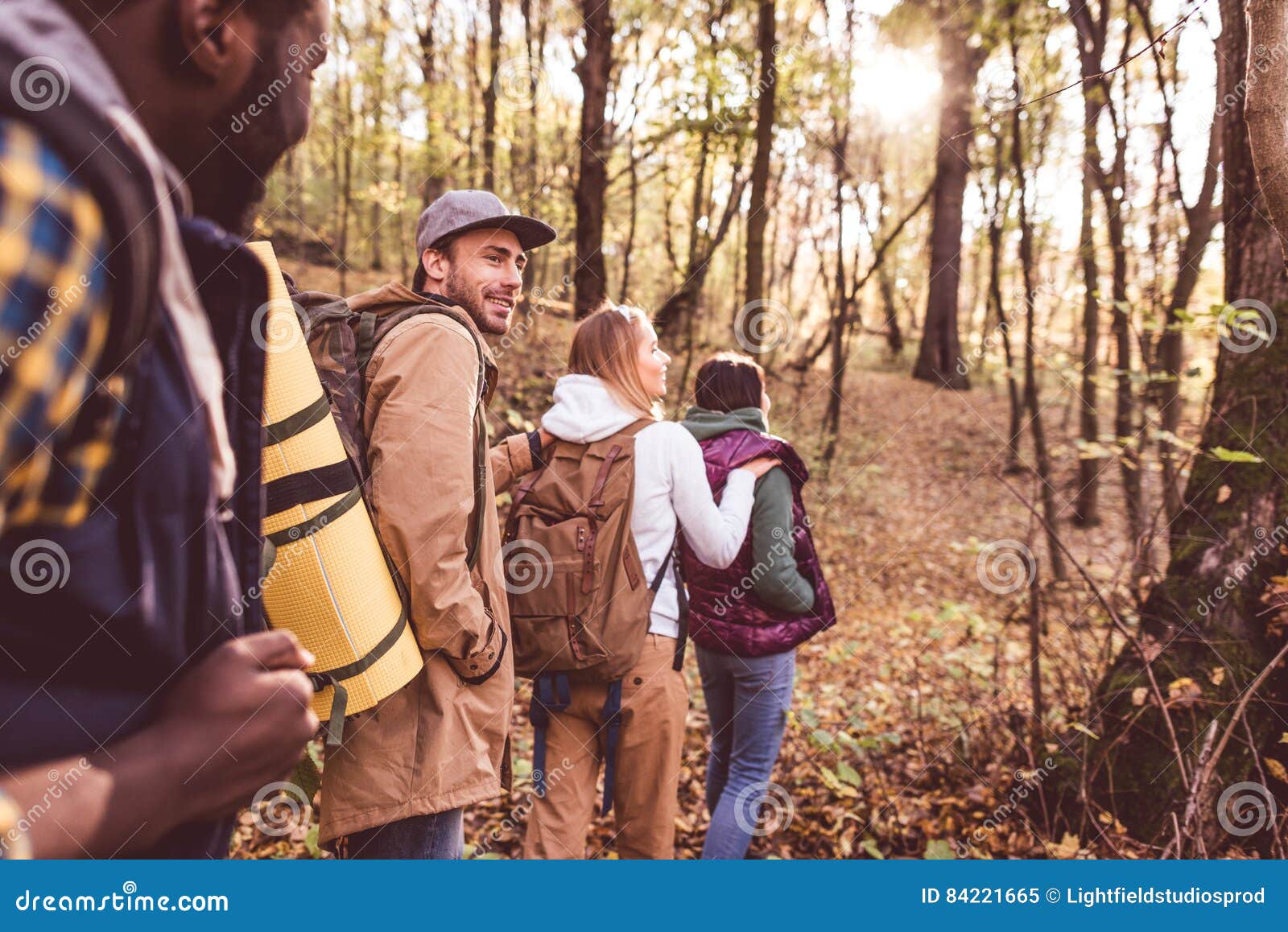 Young Backpackers in Autumn Forest Stock Image - Image of leaves ...