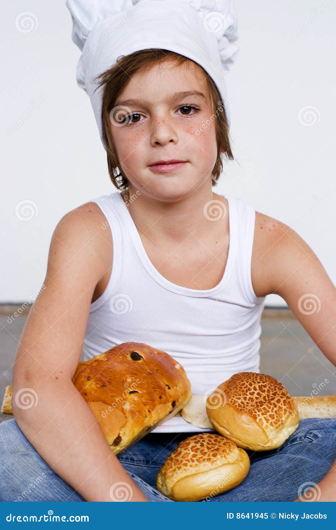 Young baker boy and bread stock image. Image of happy - 8641945