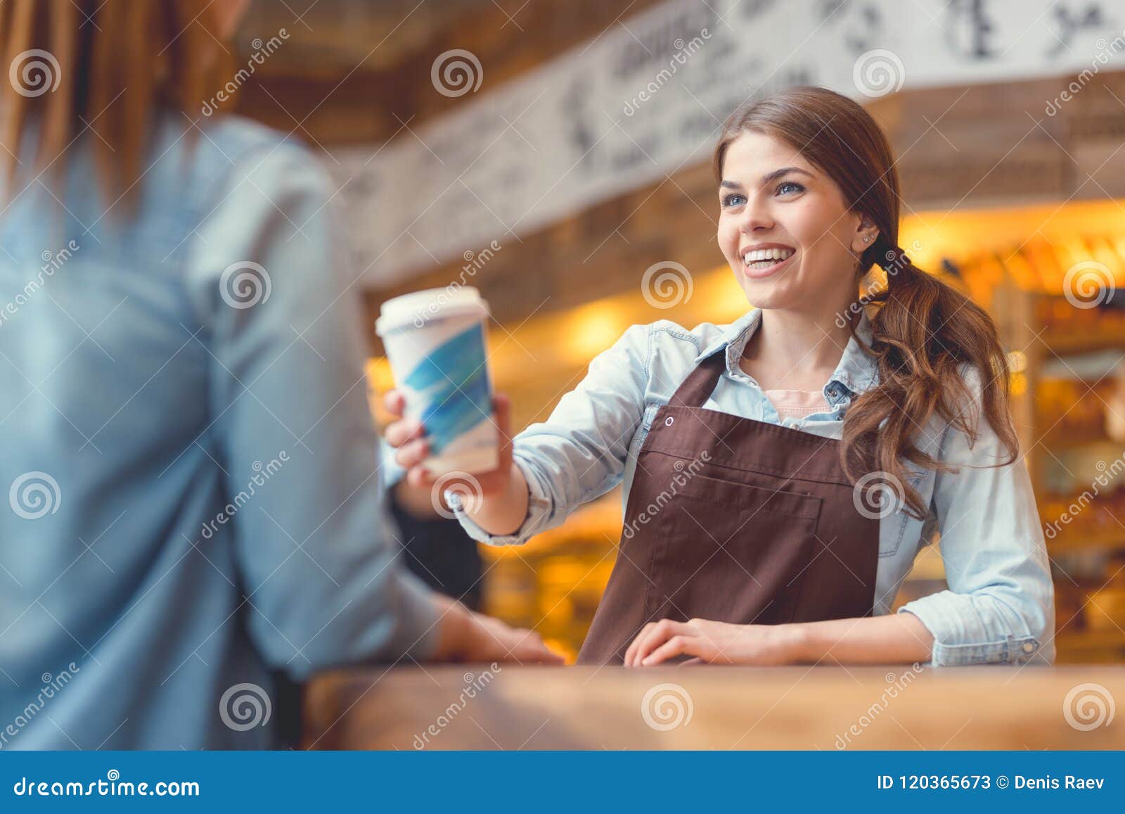 Young Baker and Customer in the Bakery Stock Image - Image of adults ...