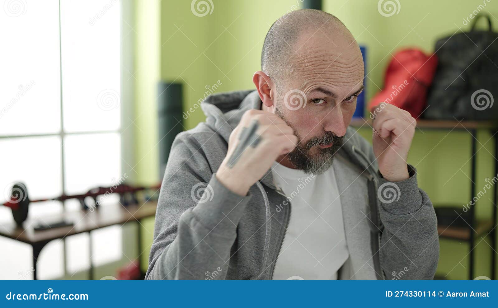 Young Bald Man Boxing at Sport Center Stock Photo - Image of person ...