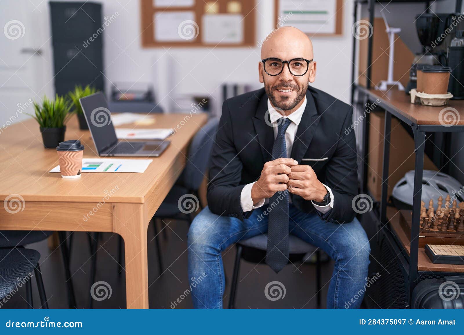 Young Bald Man Business Worker Smiling Confident Sitting on Table at ...