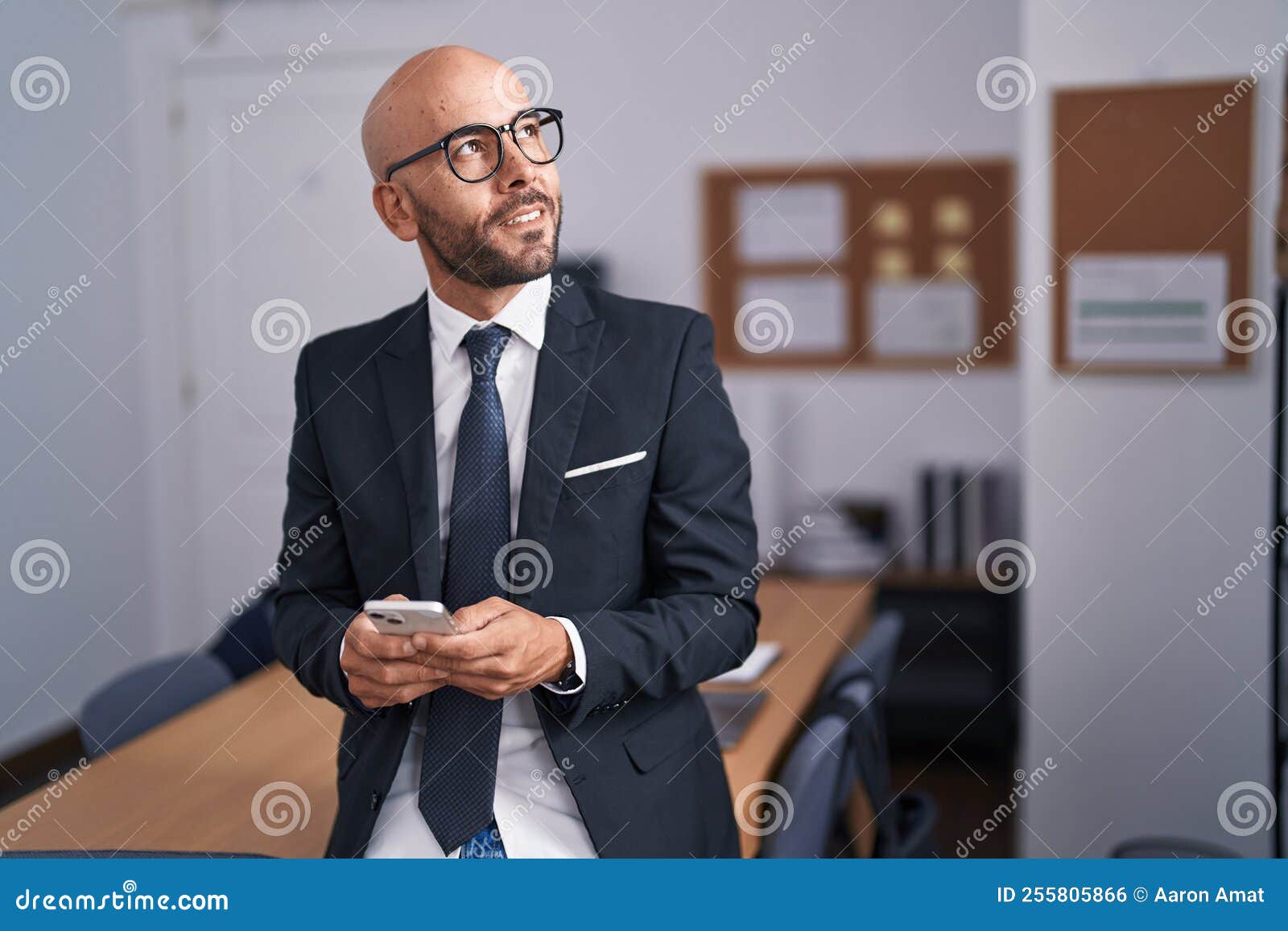 Young Bald Man Business Worker Smiling Confident Using Smartphone at ...