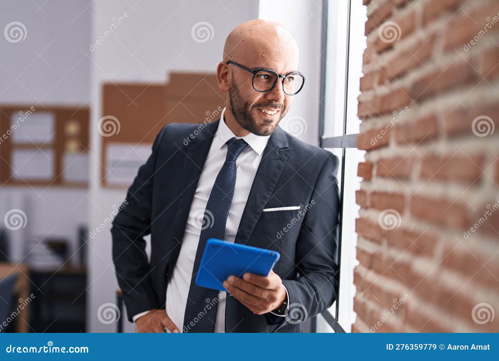 Young Bald Man Business Worker Smiling Confident Using Touchpad at ...