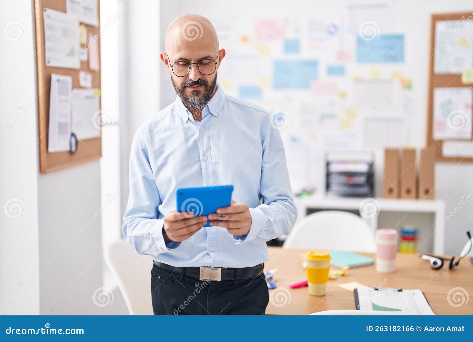 Young Bald Man Business Worker Using Touchpad at Office Stock Photo ...