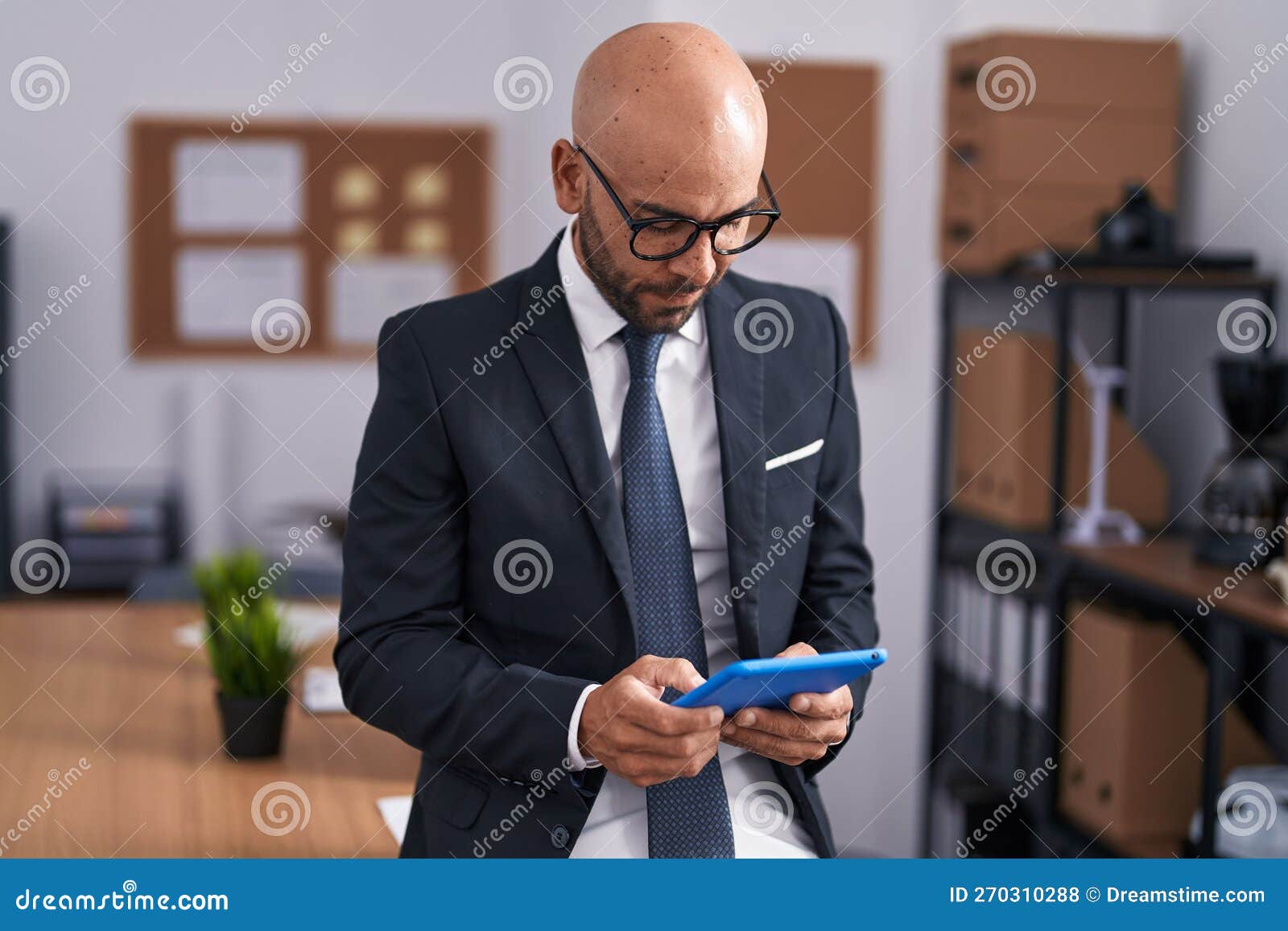 Young Bald Man Business Worker Using Touchpad at Office Stock Photo ...