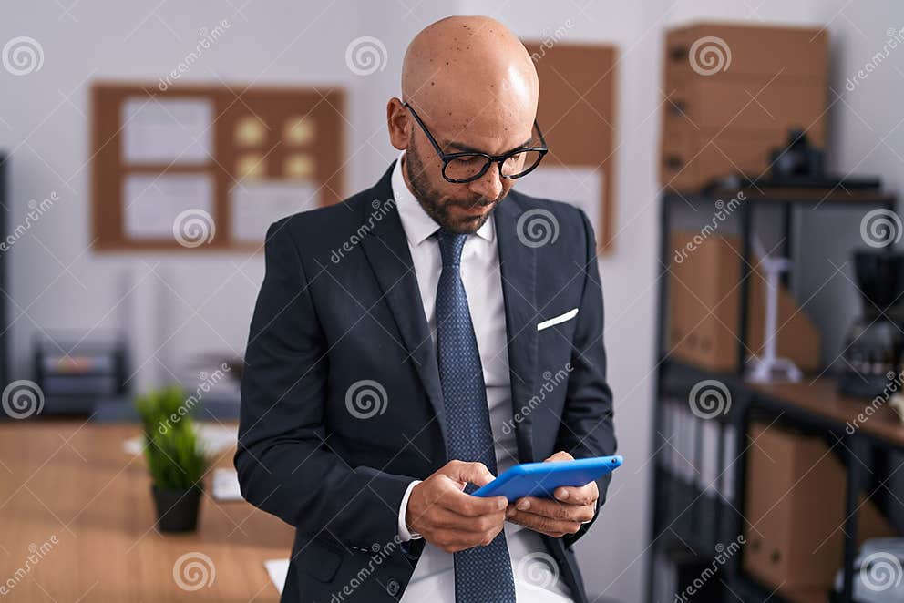 Young Bald Man Business Worker Using Touchpad at Office Stock Photo ...