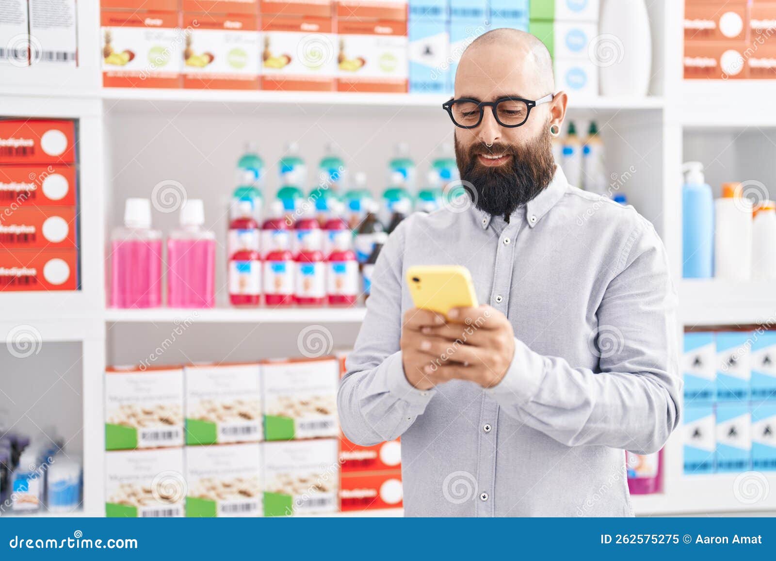 Young Bald Man Customer Smiling Confident Using Smartphone at Pharmacy ...