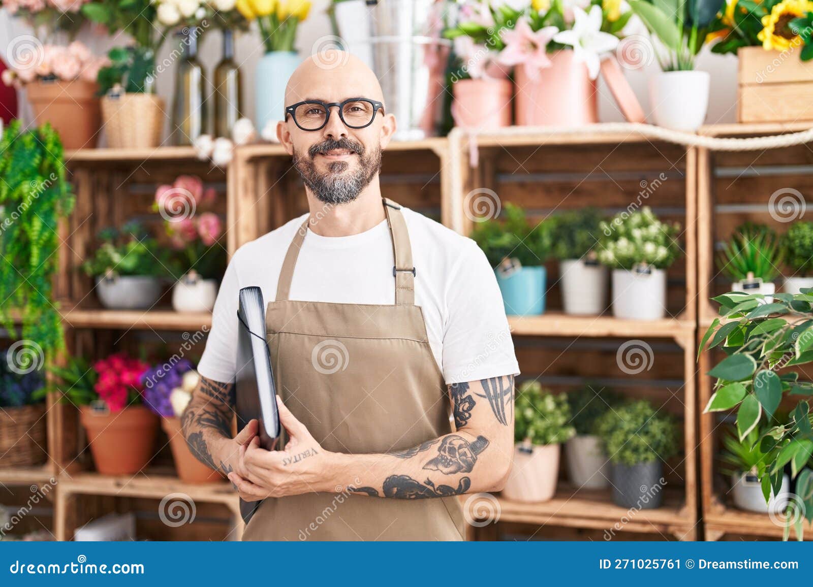 Young Bald Man Florist Smiling Confident Holding Binder at Florist ...
