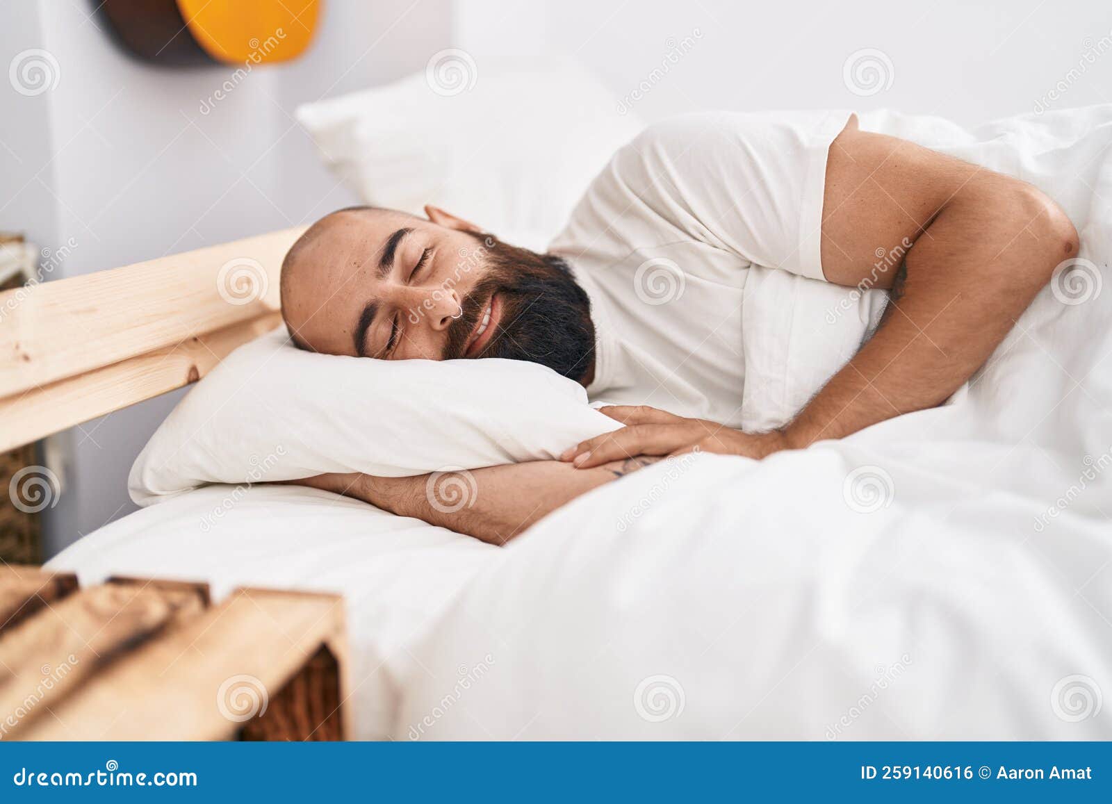 Young Bald Man Lying on Bed Sleeping at Bedroom Stock Photo - Image of ...