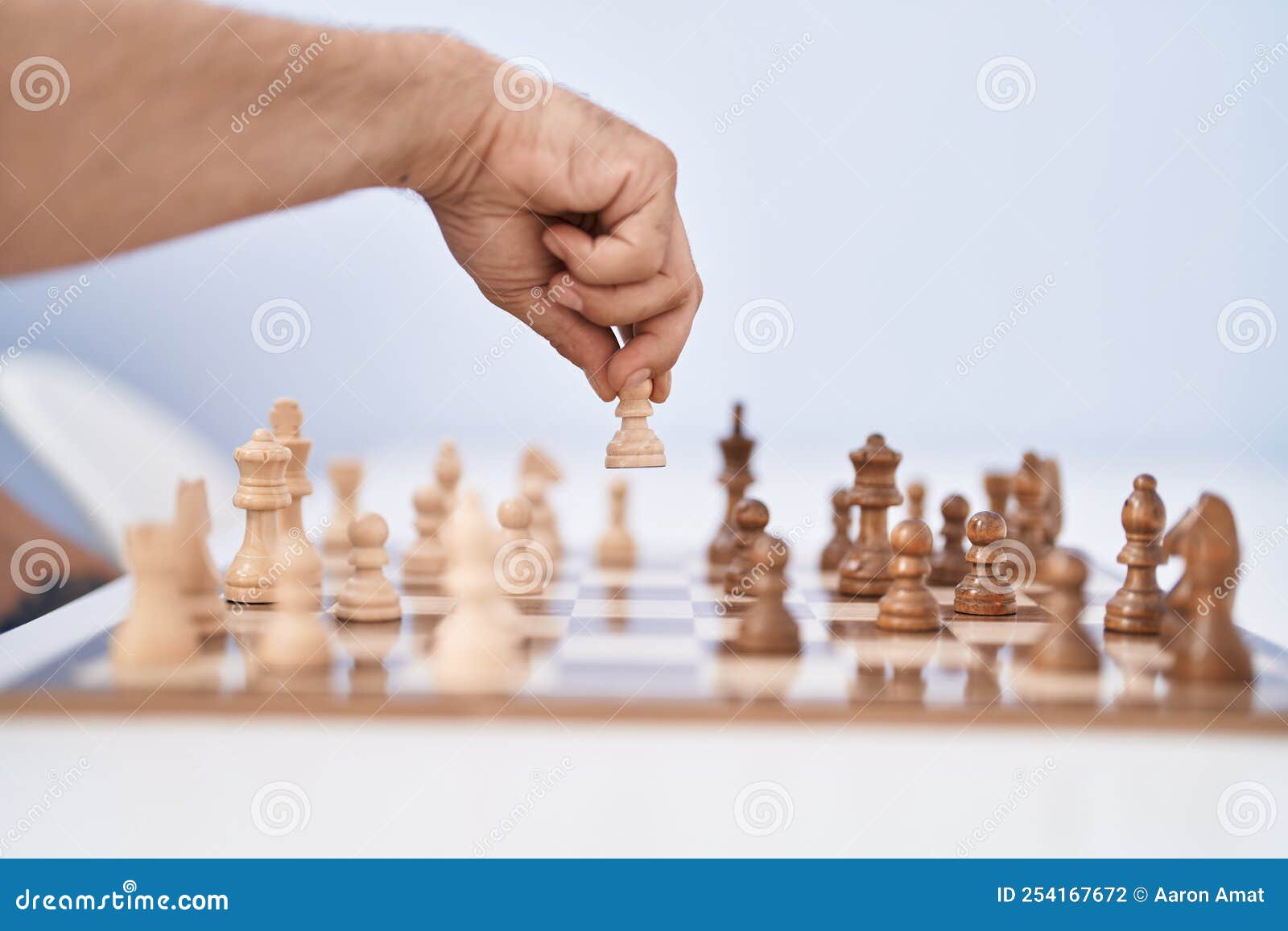 Young Bald Man Playing Chess Sitting on Table at Home Stock Photo ...