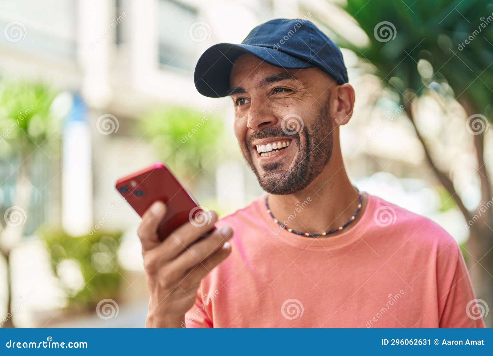 Young Bald Man Smiling Confident Talking on the Smartphone at Street ...