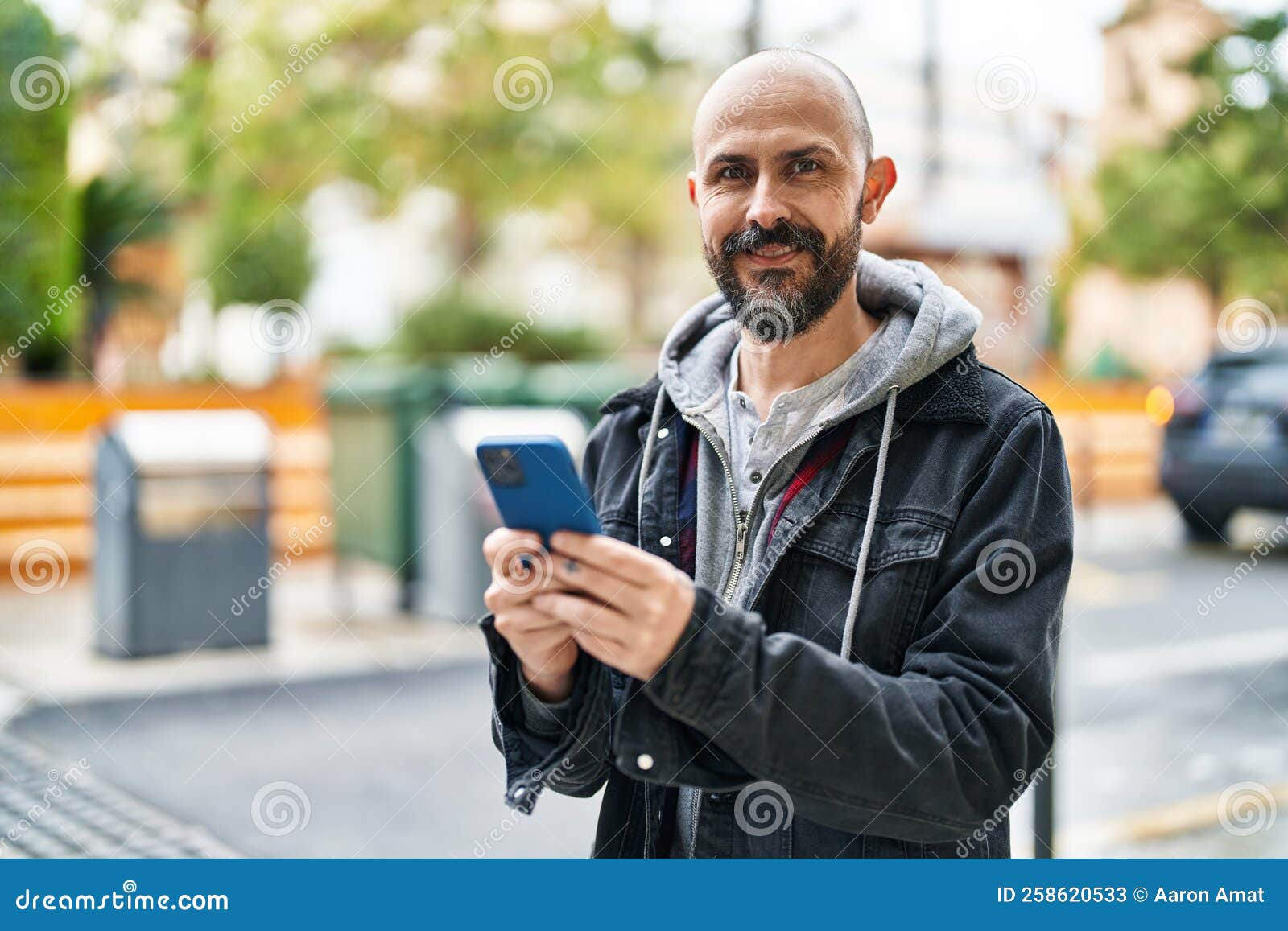 Young Bald Man Smiling Confident Using Smartphone at Street Stock Image ...
