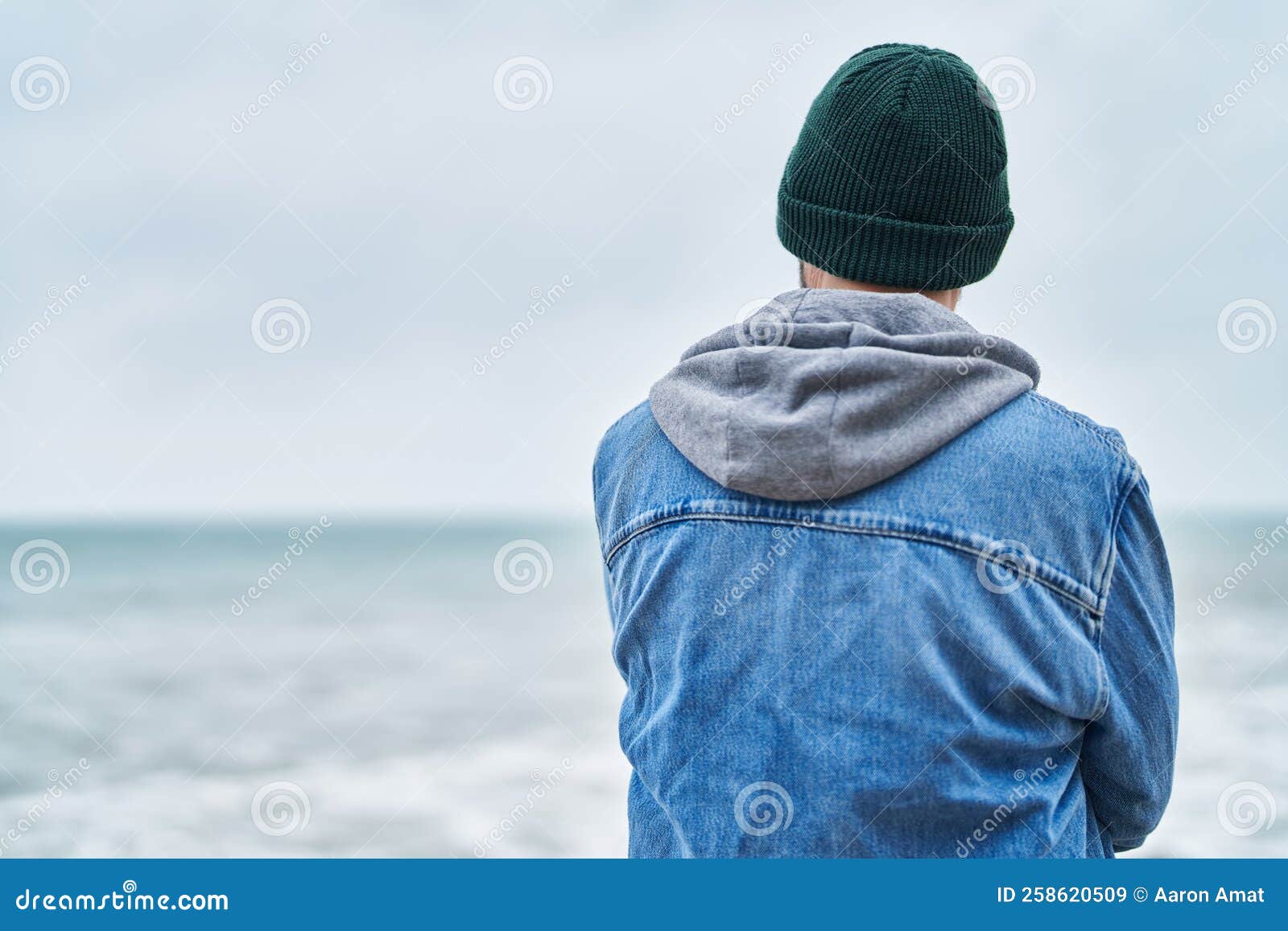 Young Bald Man Standing on Back View at Seaside Stock Image - Image of ...