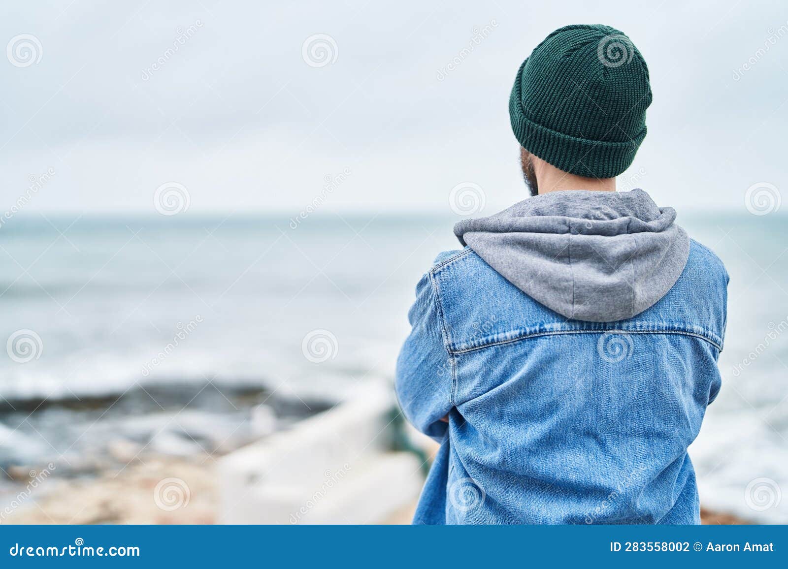 Young Bald Man Standing on Back View at Seaside Stock Photo - Image of ...