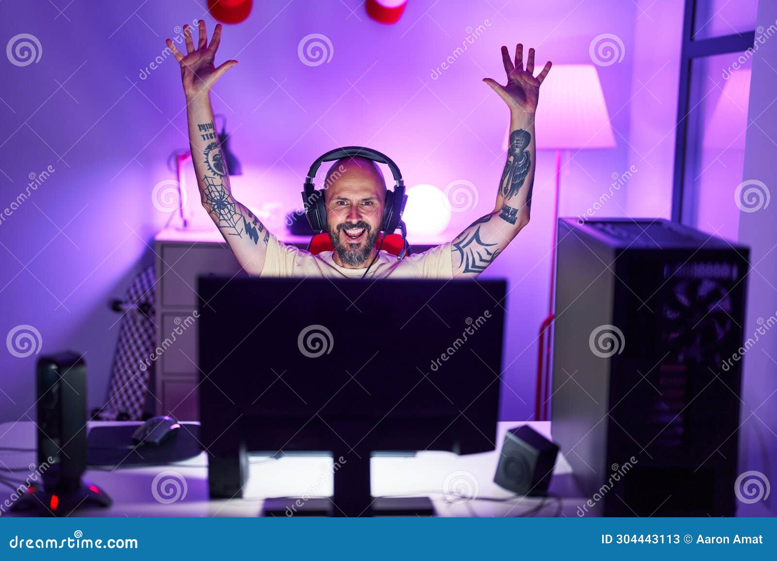Young Bald Man Streamer Playing Video Game with Winner Expression at ...
