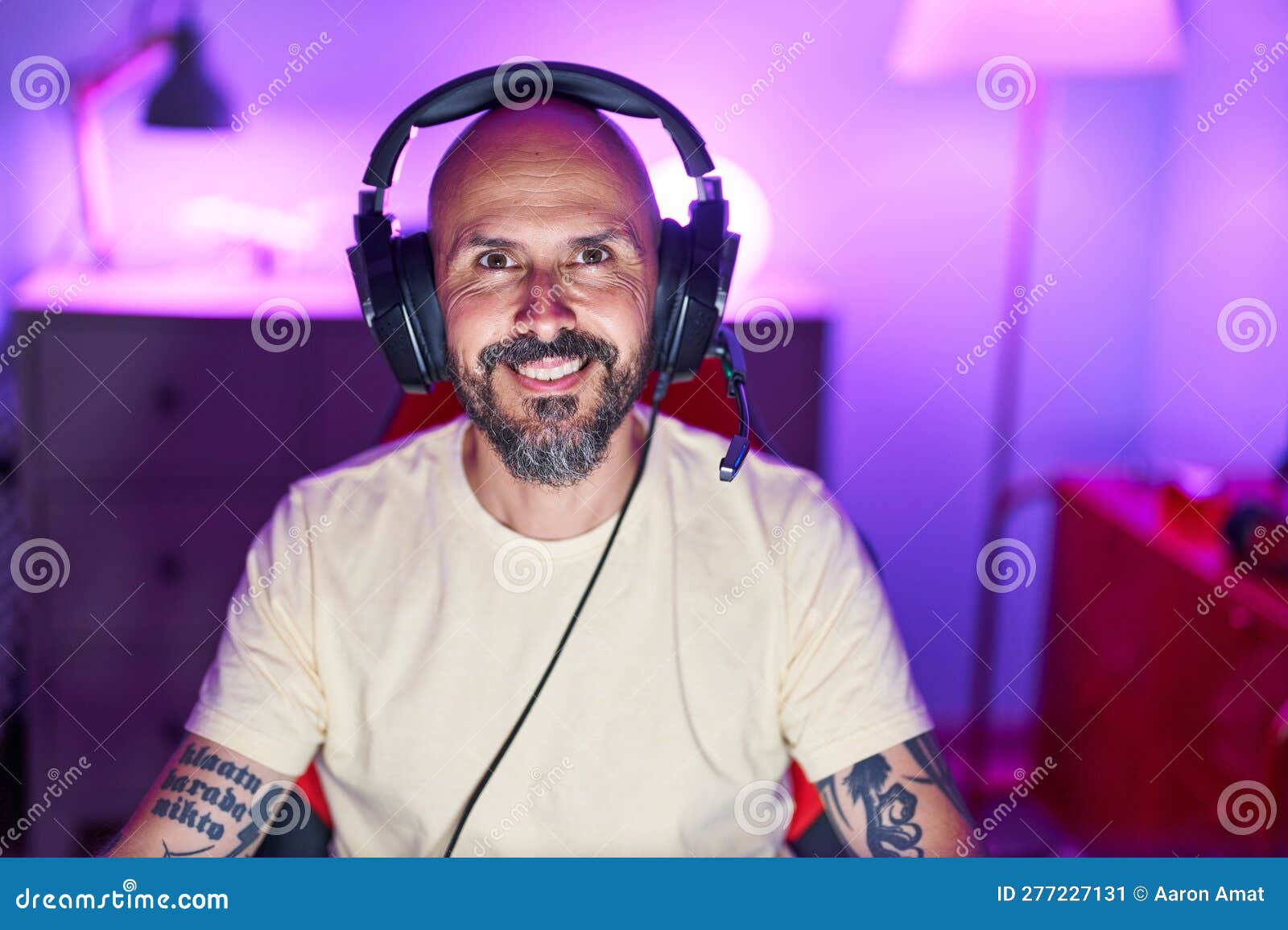 Young Bald Man Streamer Smiling Confident Sitting on Table at Gaming ...