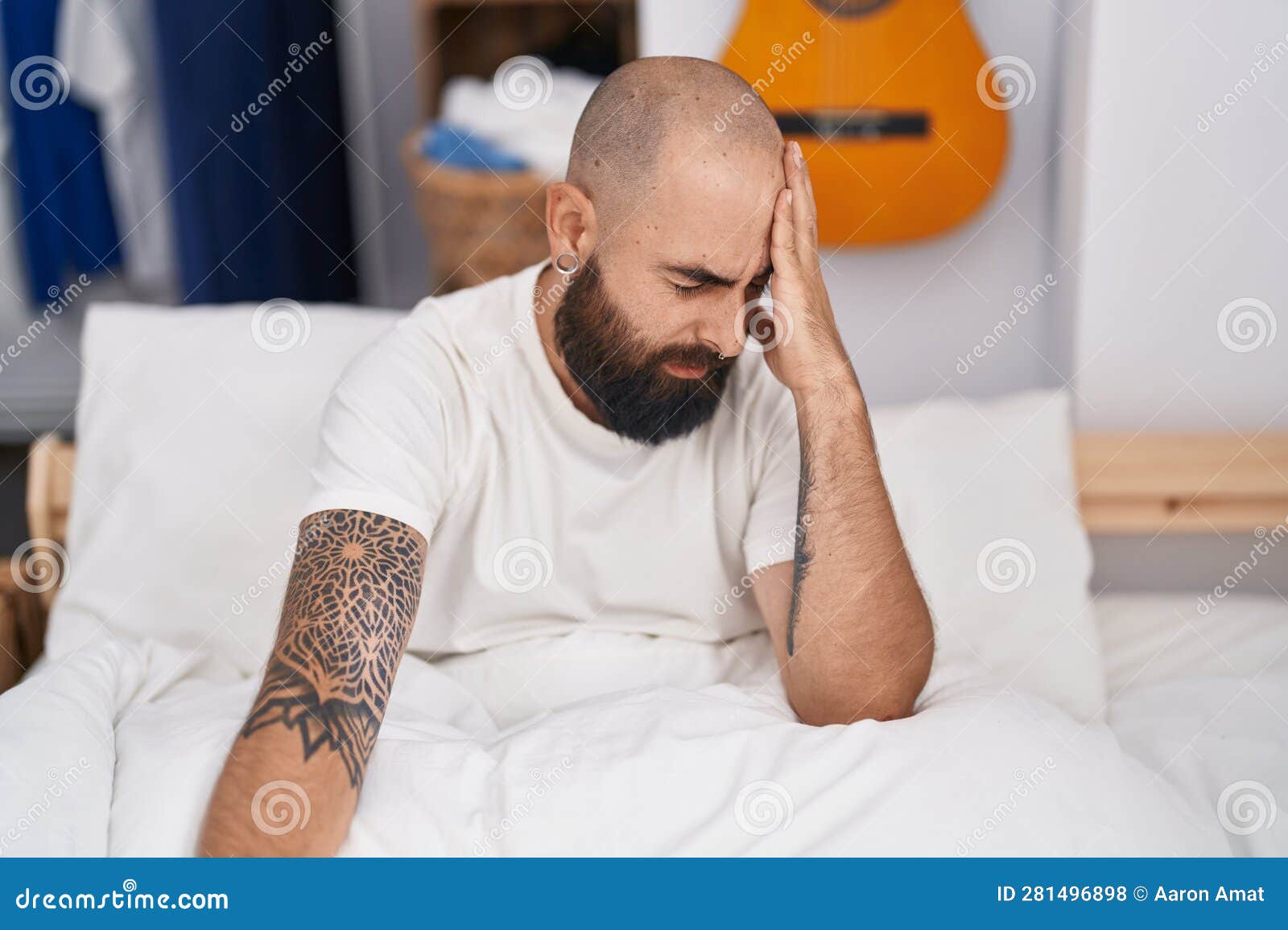 Young Bald Man Stressed Sitting on Bed at Bedroom Stock Photo - Image ...