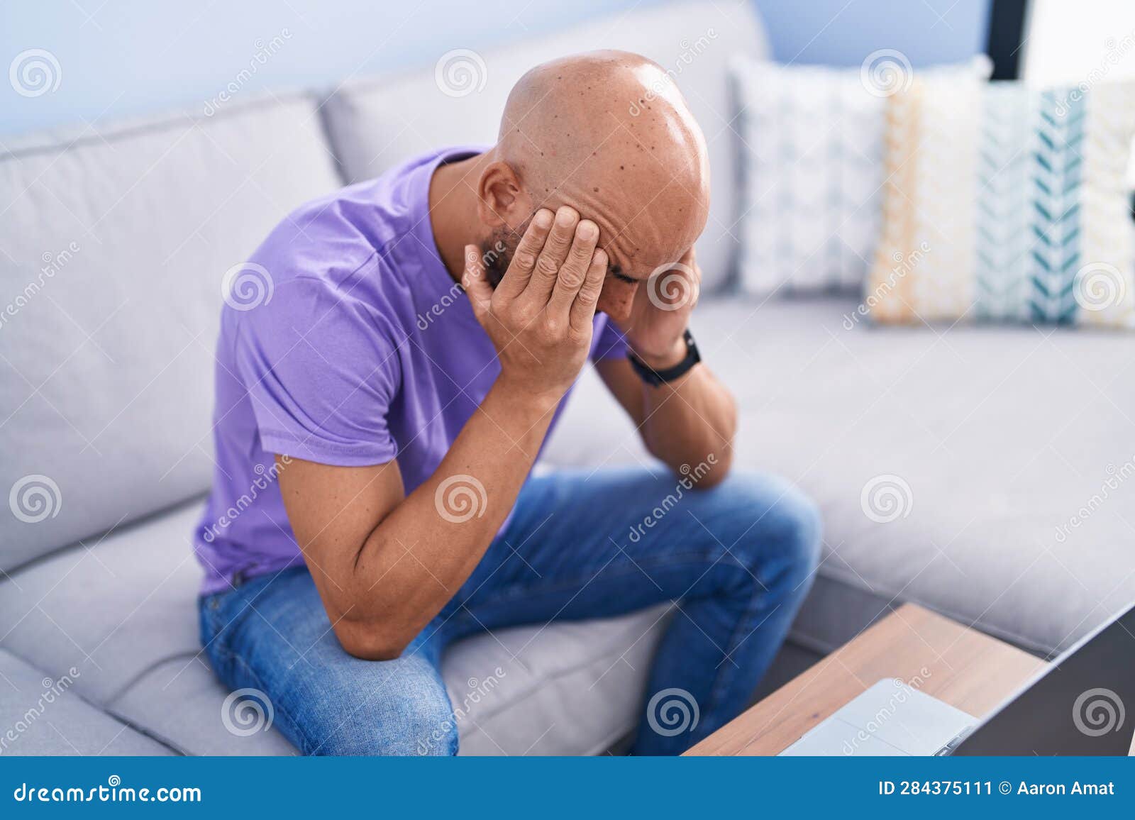 Young Bald Man Stressed Sitting on Sofa at Home Stock Image - Image of ...