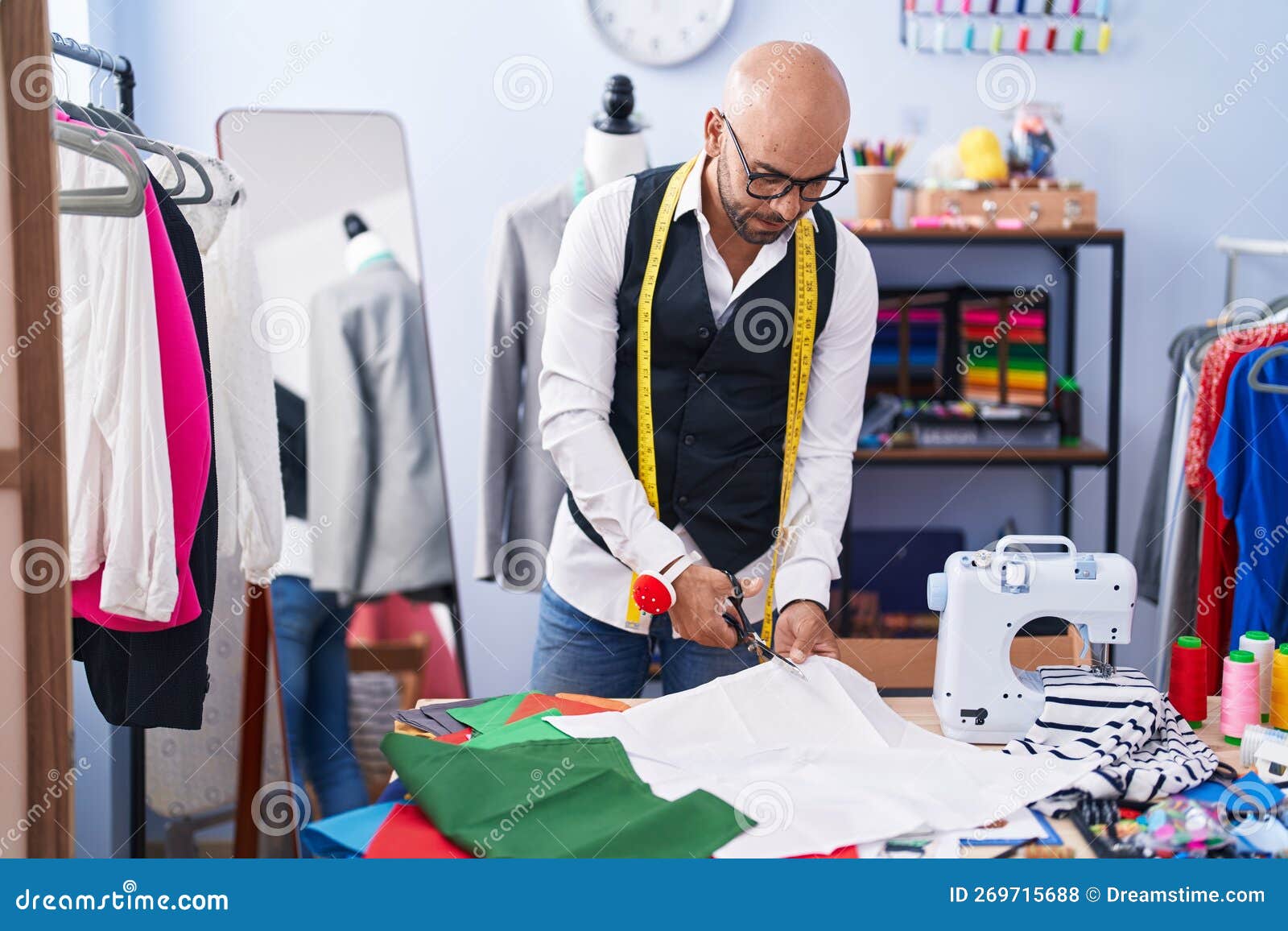 Young Bald Man Tailor Cutting Cloth at Tailor Shop Stock Photo - Image ...