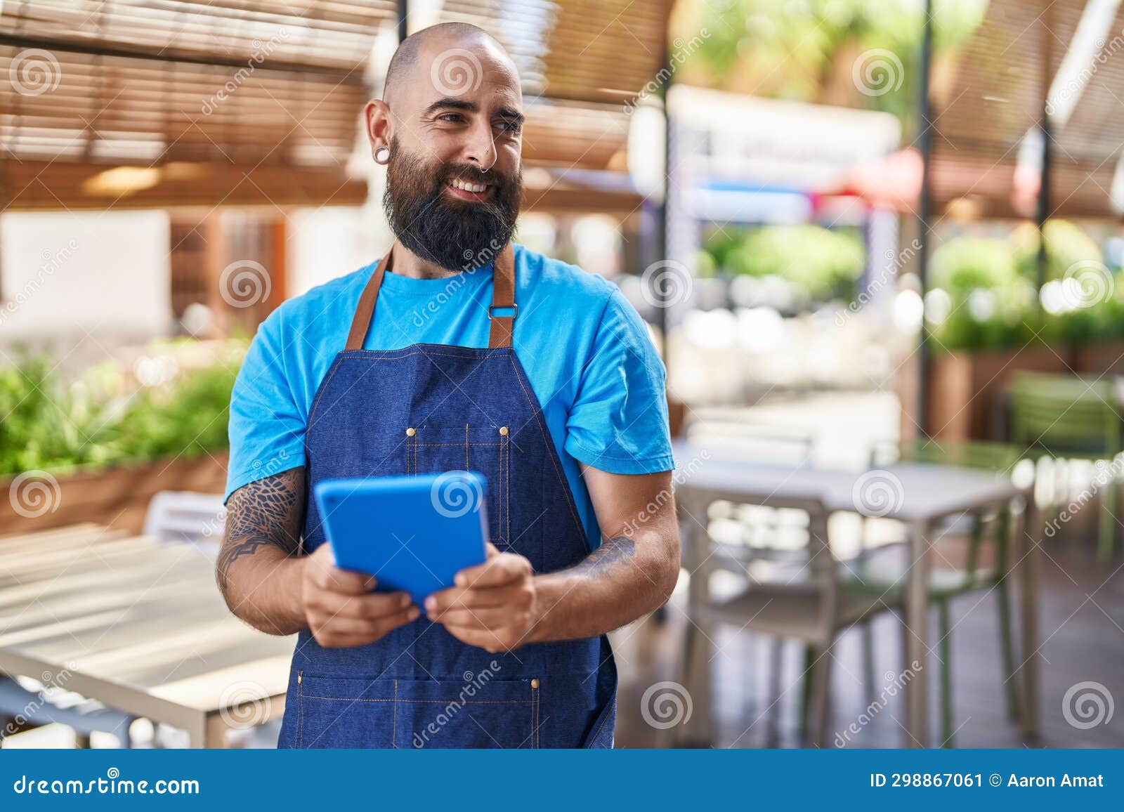 Young Bald Man Waiter Smiling Confident Using Touchpad at Coffee Shop ...