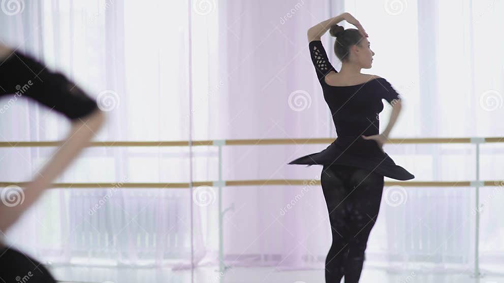 Young Ballet Dancer Dancing on the Background of a Large Window. Stock ...