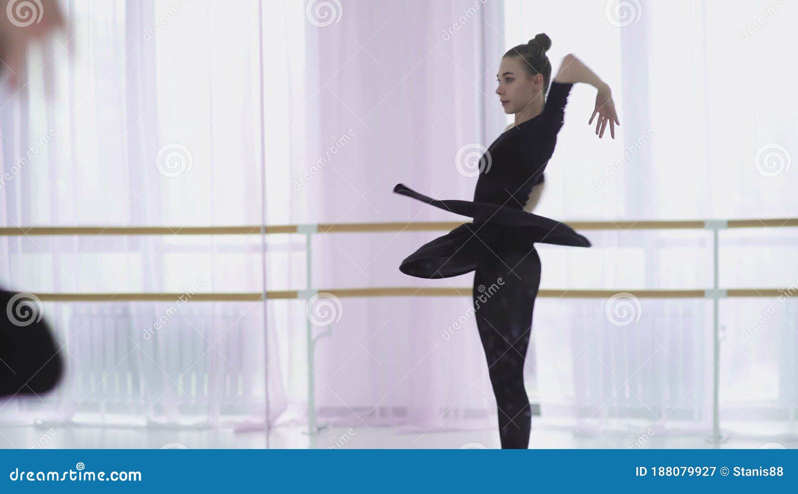 Young Ballet Dancer Dancing on the Background of a Large Window. Stock ...