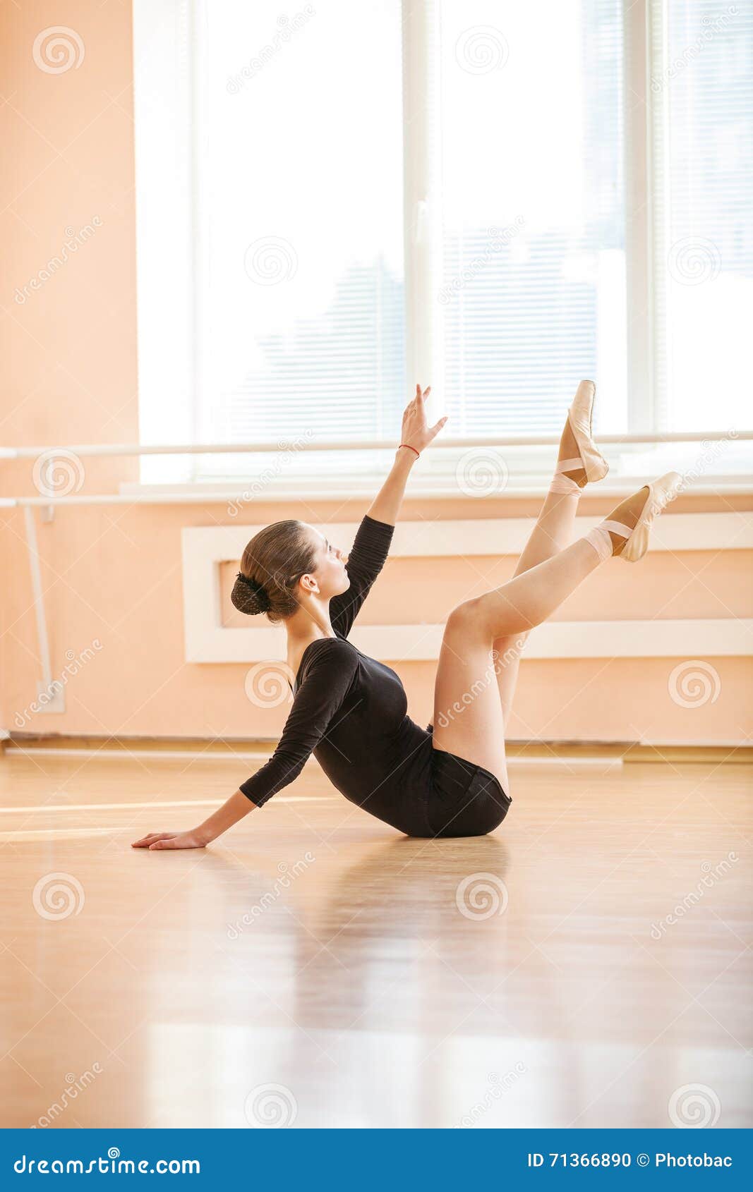 Young Ballet Dancer Performing Exercise Stock Photo - Image of person ...