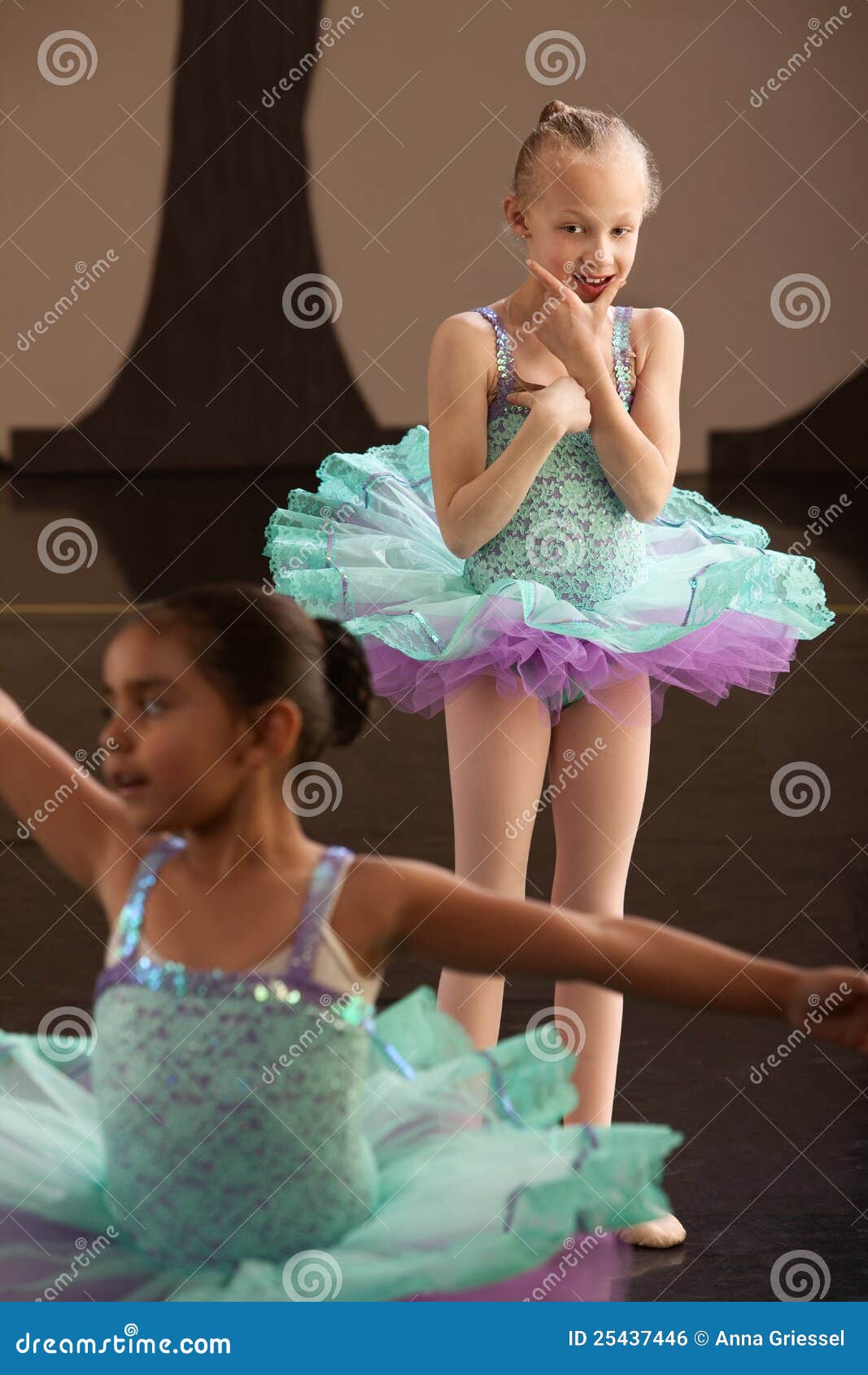 Young Ballet Student Watches Friend Stock Photo - Image of chin ...