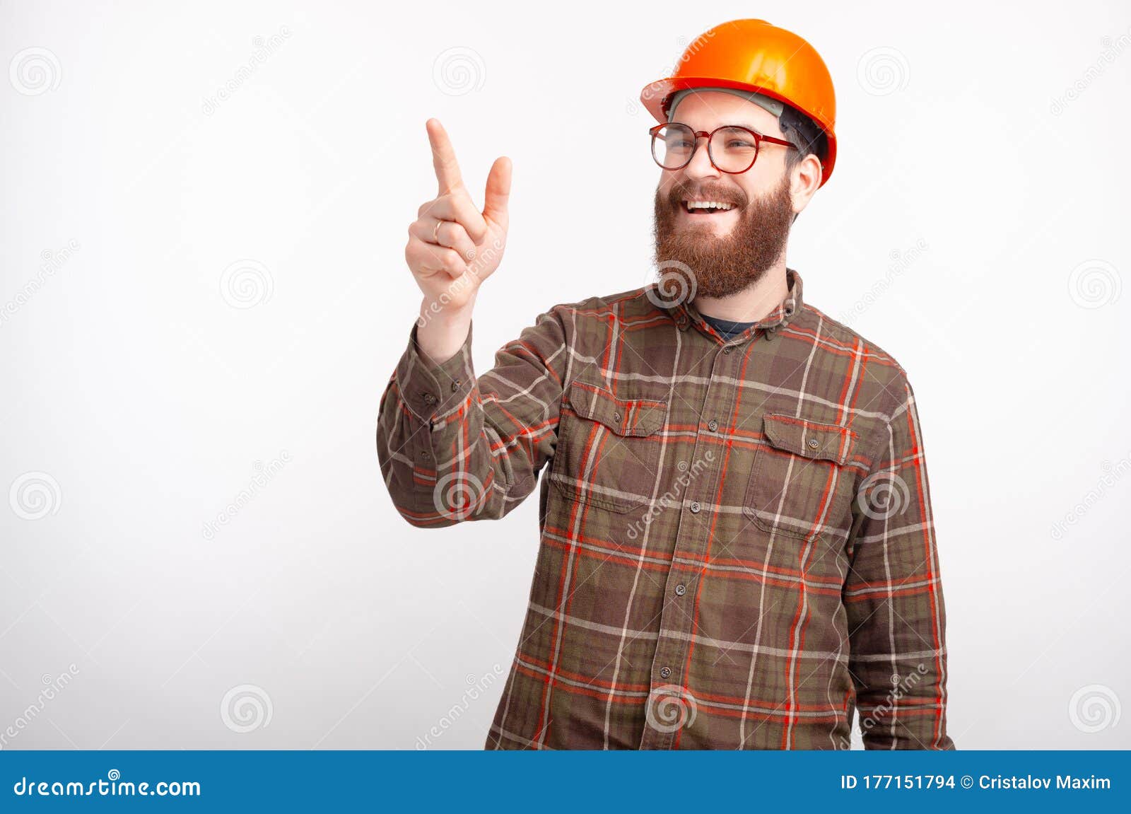Young Bearded Builder Engineer or Architect is Pointing Forward on ...