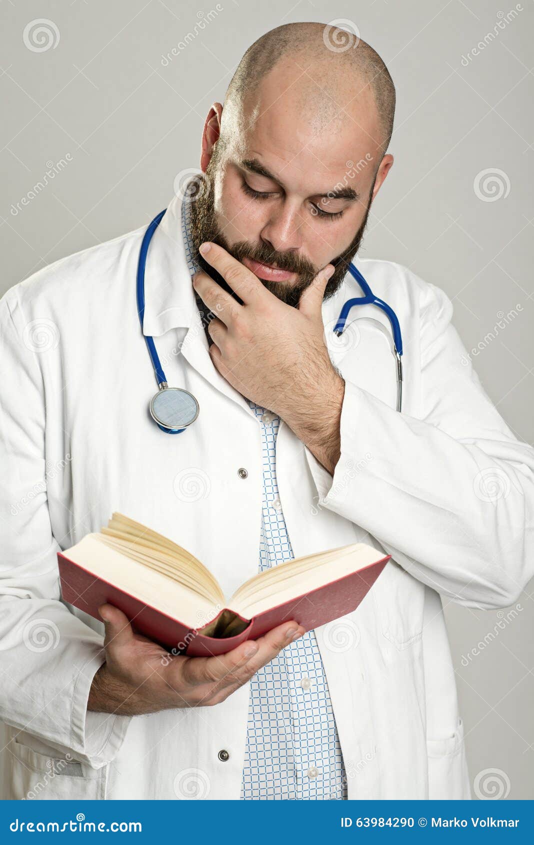 Young Bearded Doctor with Book Stock Photo - Image of handsome, beard ...