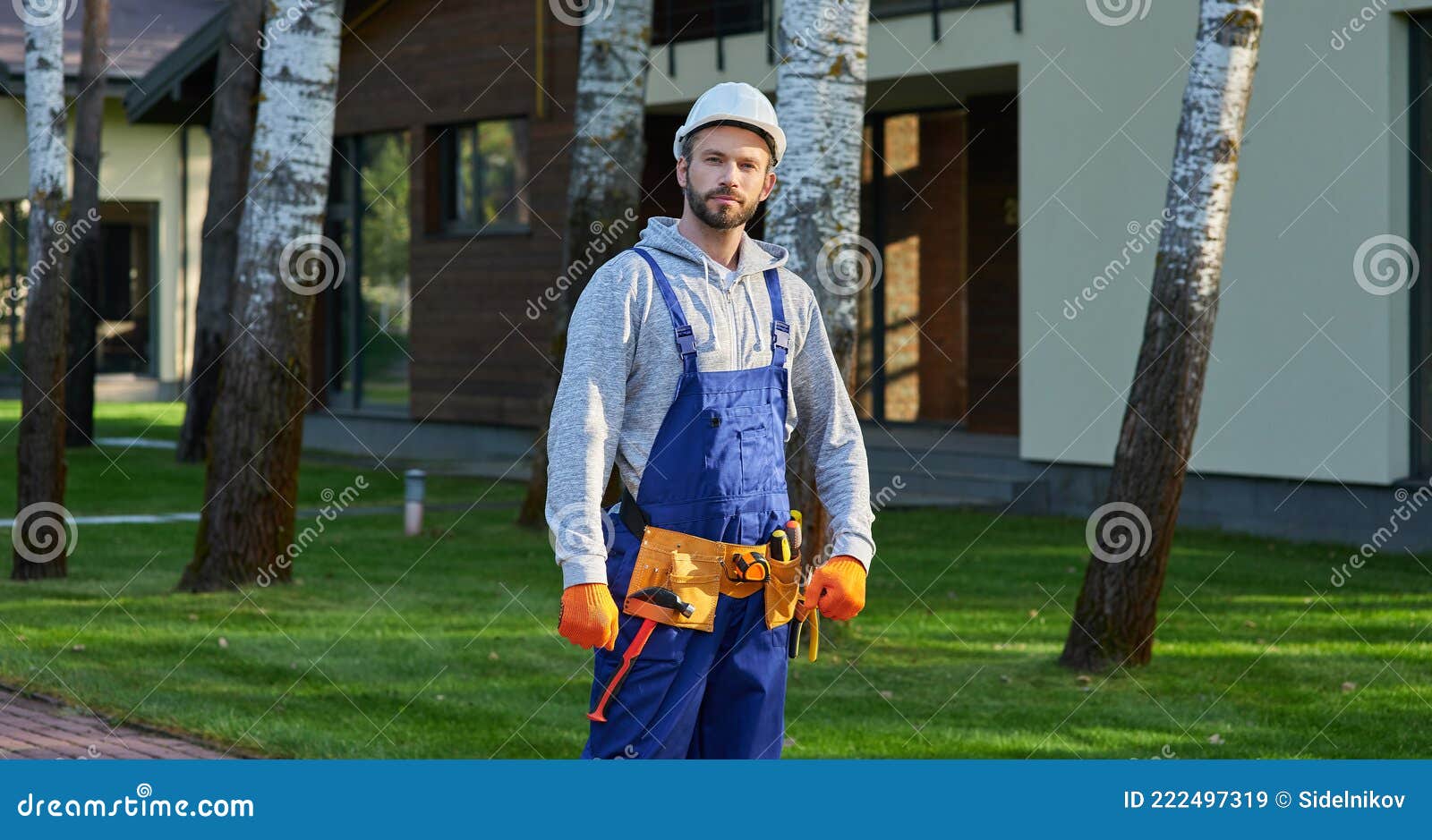 Best Worker. Young Bearded Male Engineer in Hard Hat Looking at Camera ...