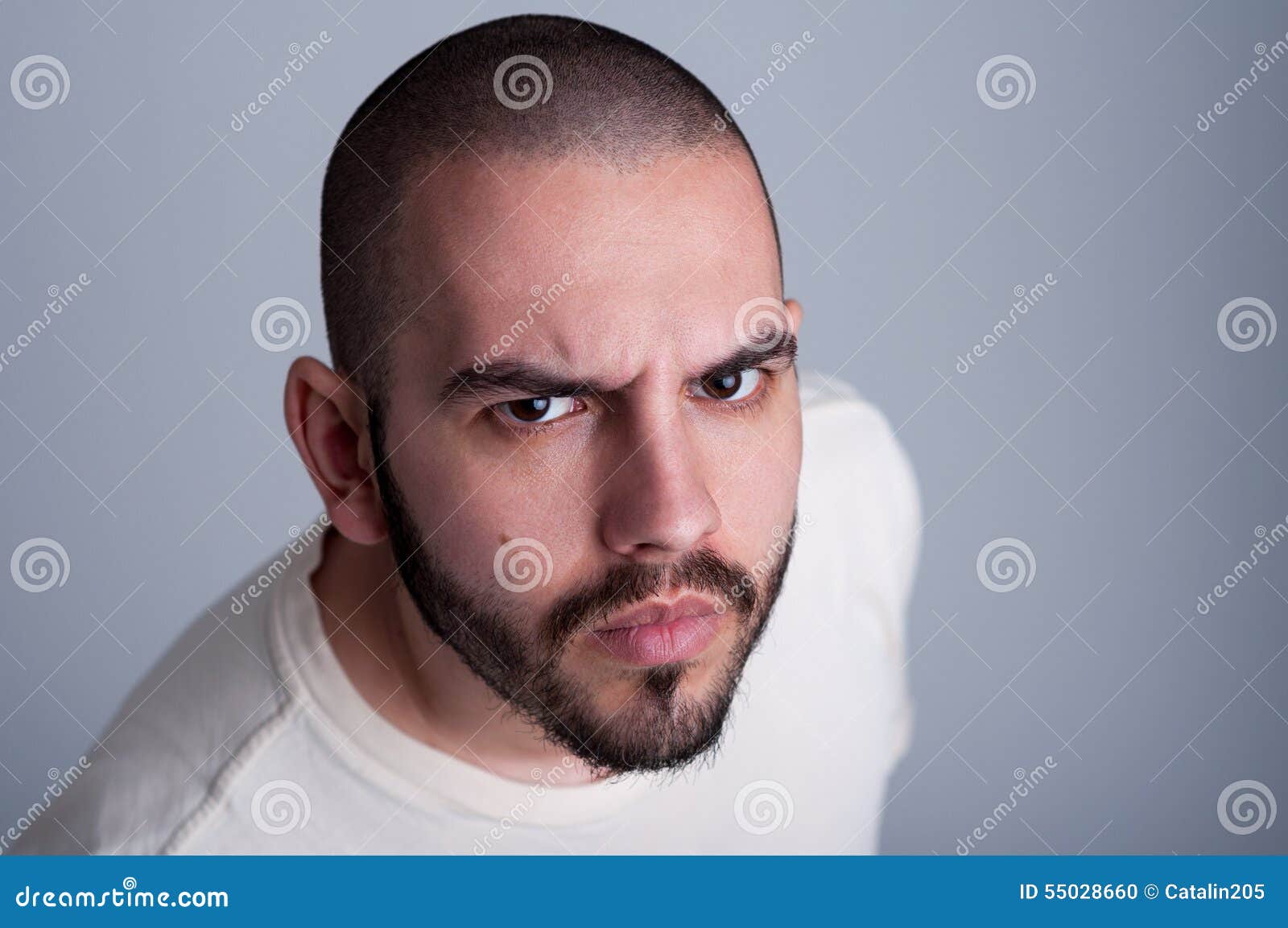 Young Bearded Man Looking Angry Stock Photo - Image of male, frowning ...
