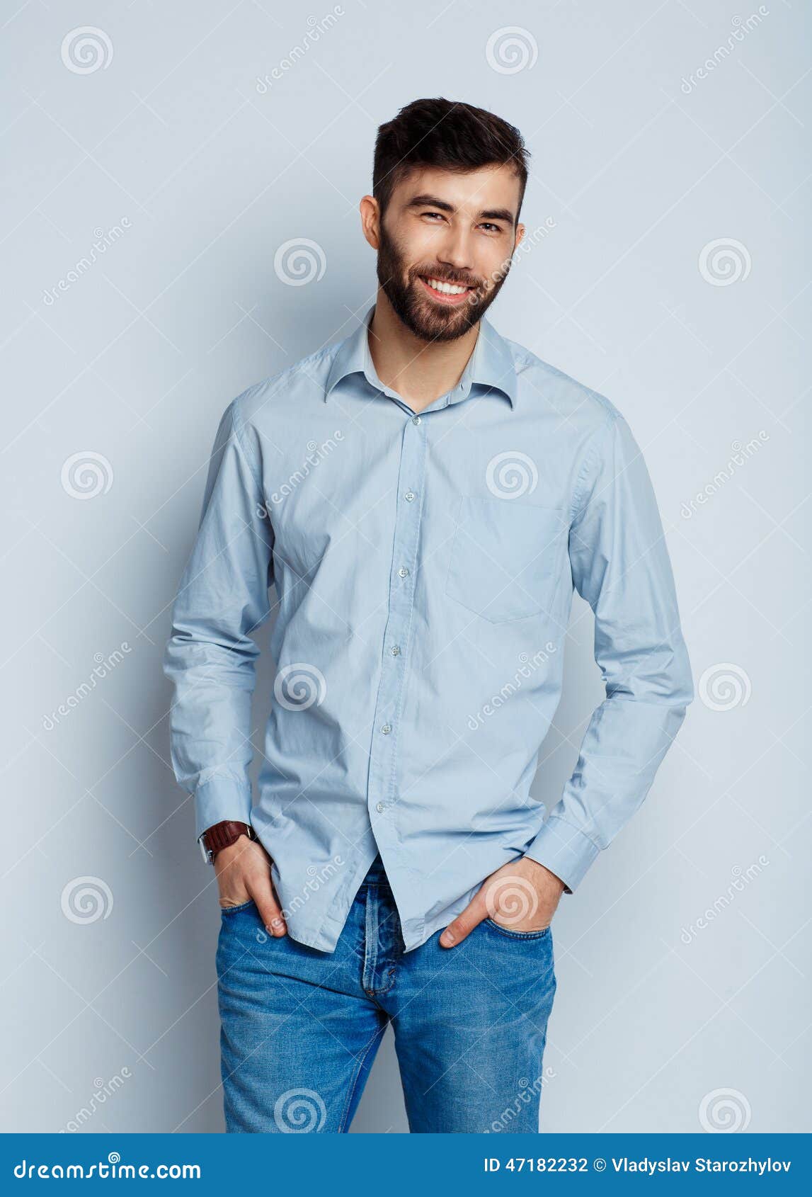 A Young Bearded Man Smiling Stock Photo - Image of gesture, happy: 47182232