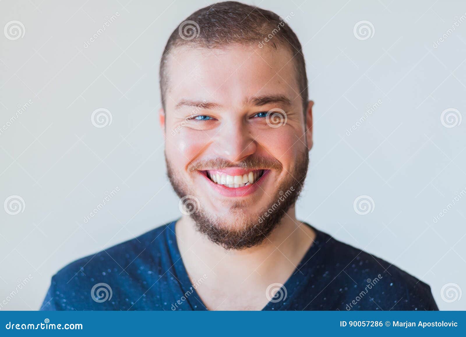 Young bearded man smiling stock photo. Image of contrast - 90057286