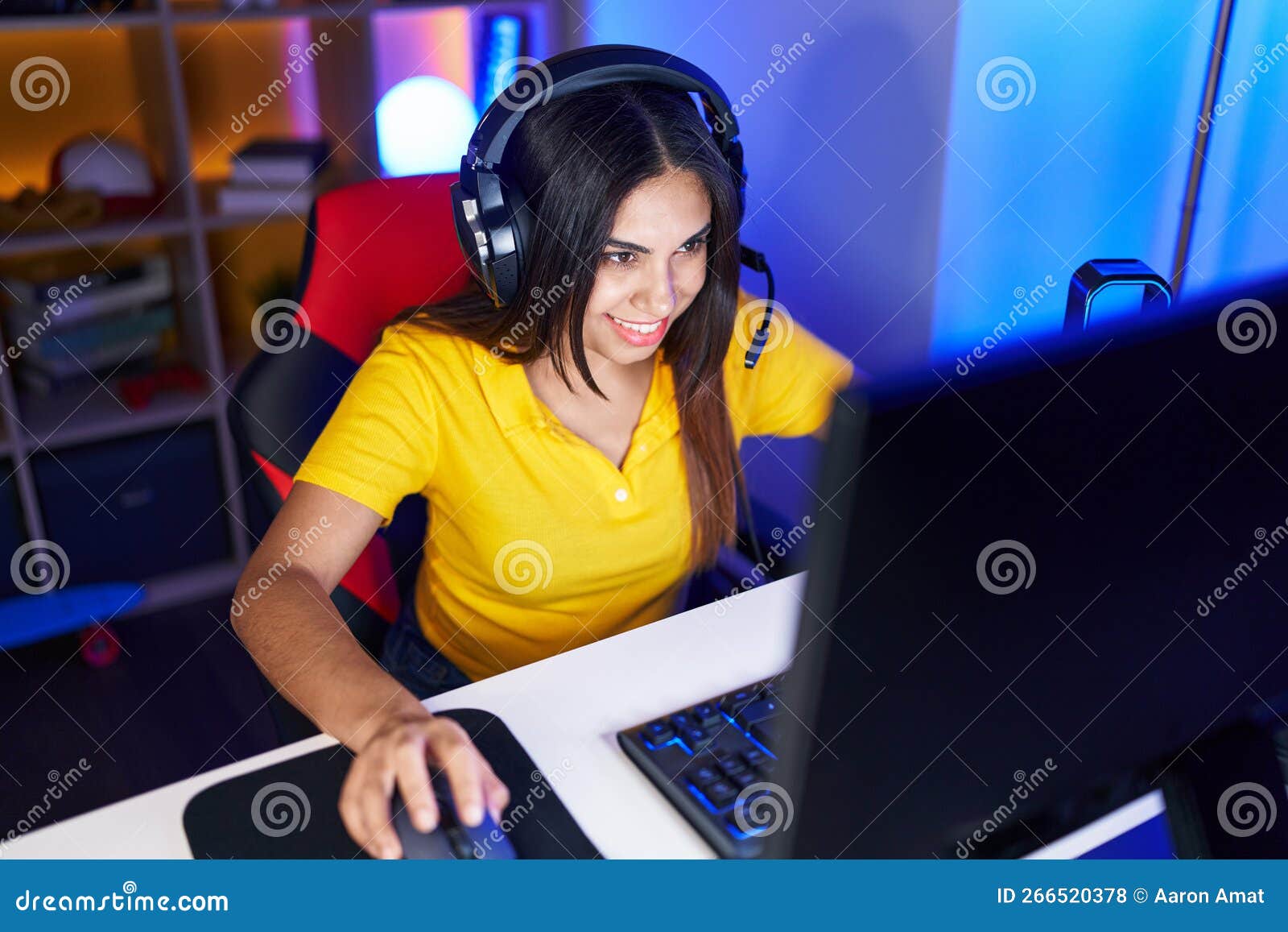 Young Beautiful Arab Woman Streamer Playing Video Game Using Computer ...