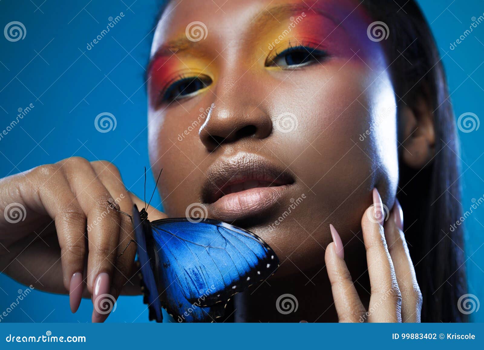 Young and Beautiful Black Model Exotic Look with Bright Blue Butterfly ...