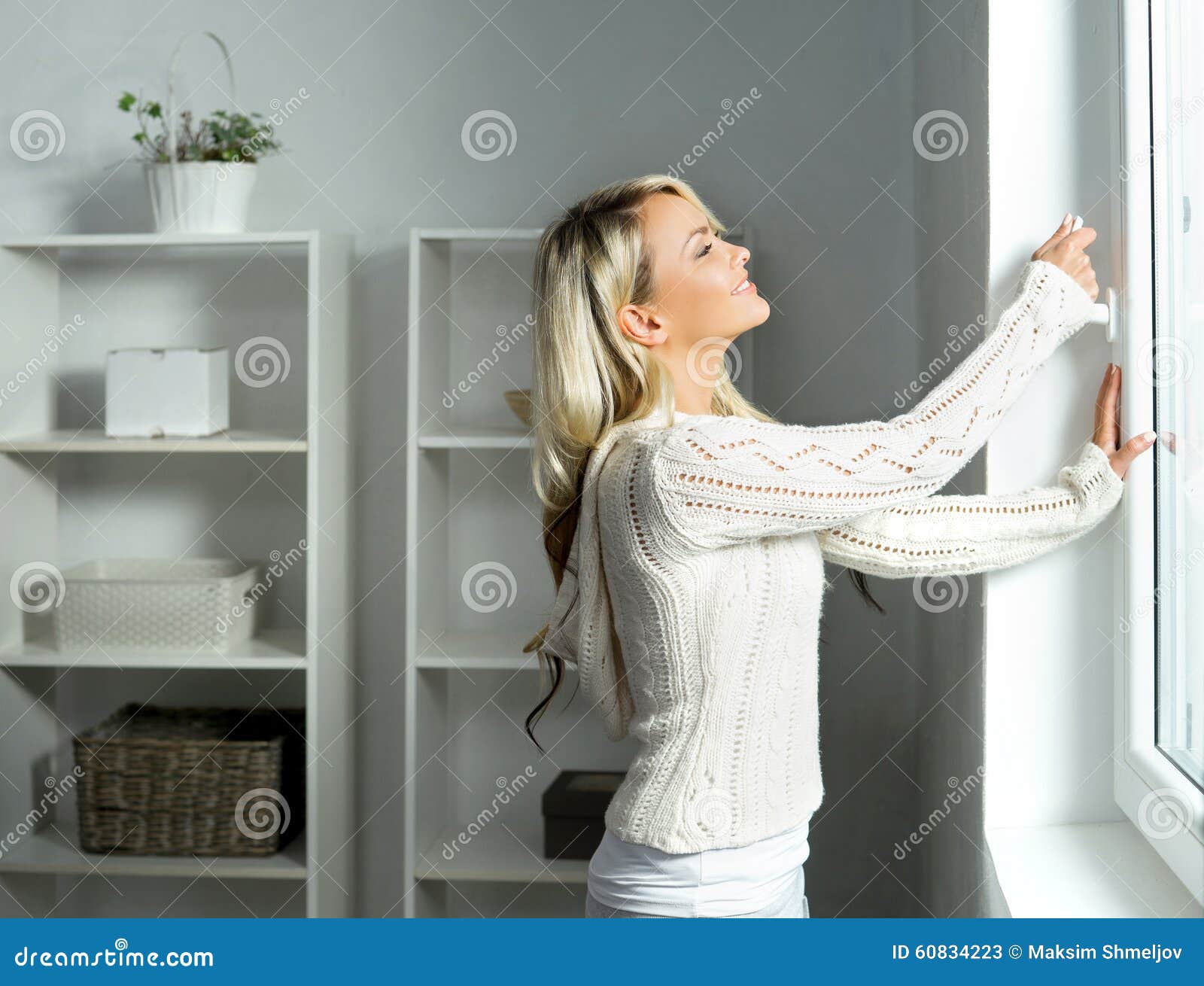 Young and Beautiful Blond Woman Opening the Window Stock Image - Image ...