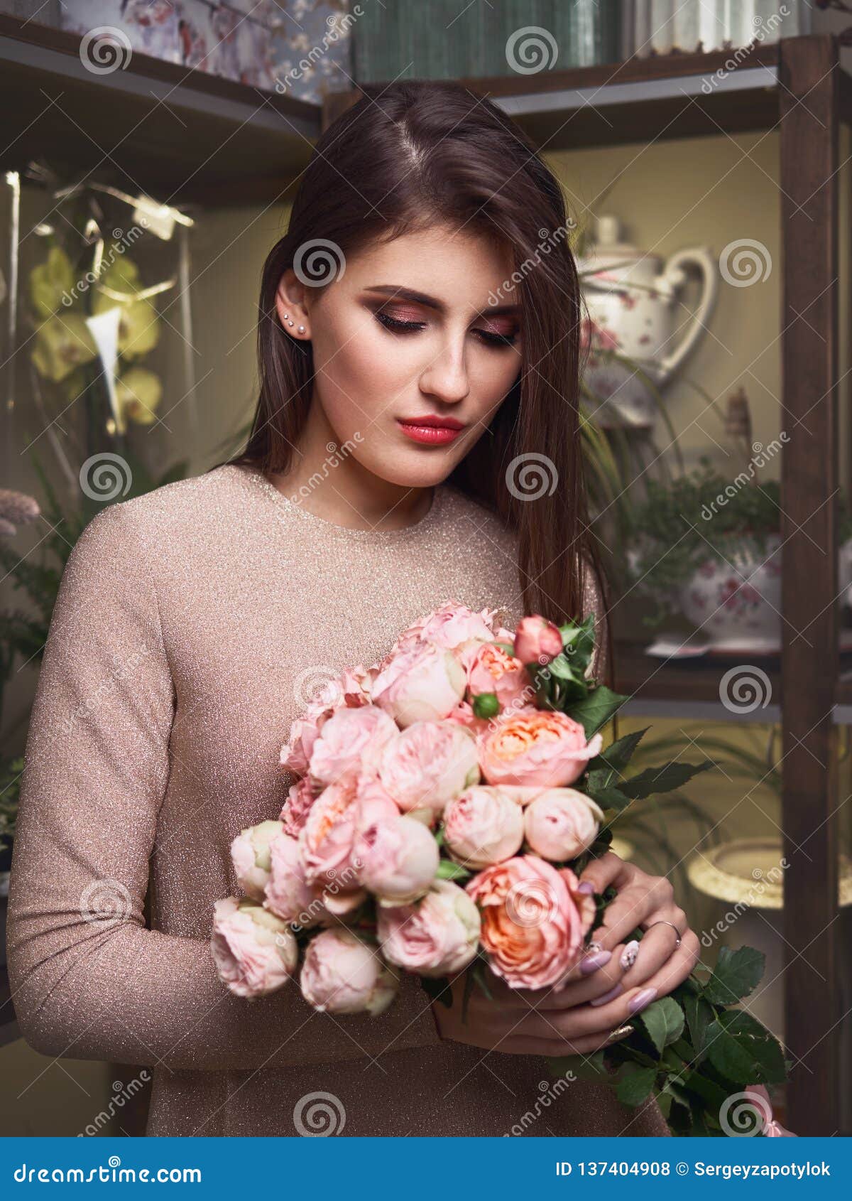 Young Beautiful Brunette Business Woman Florist Holding Trendy Bouquet