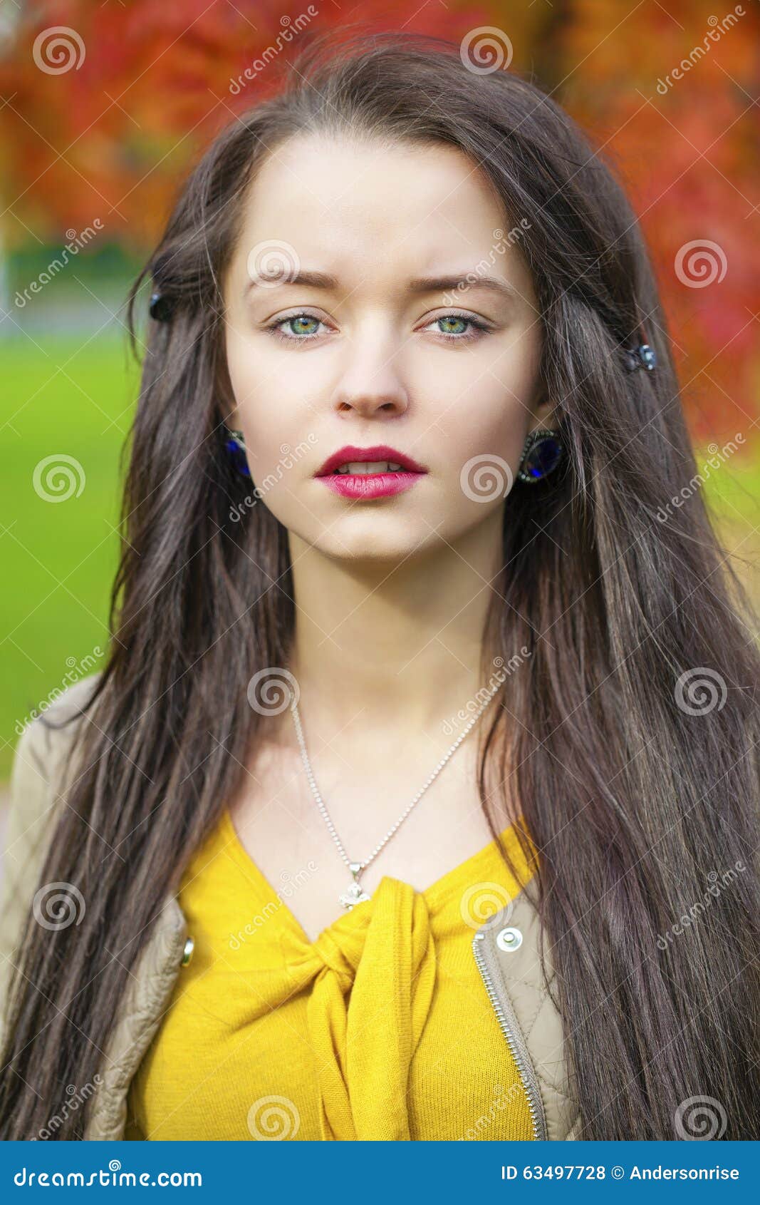 Young Beautiful Brunette Woman Posing Outdoors In Autumn Park Stock