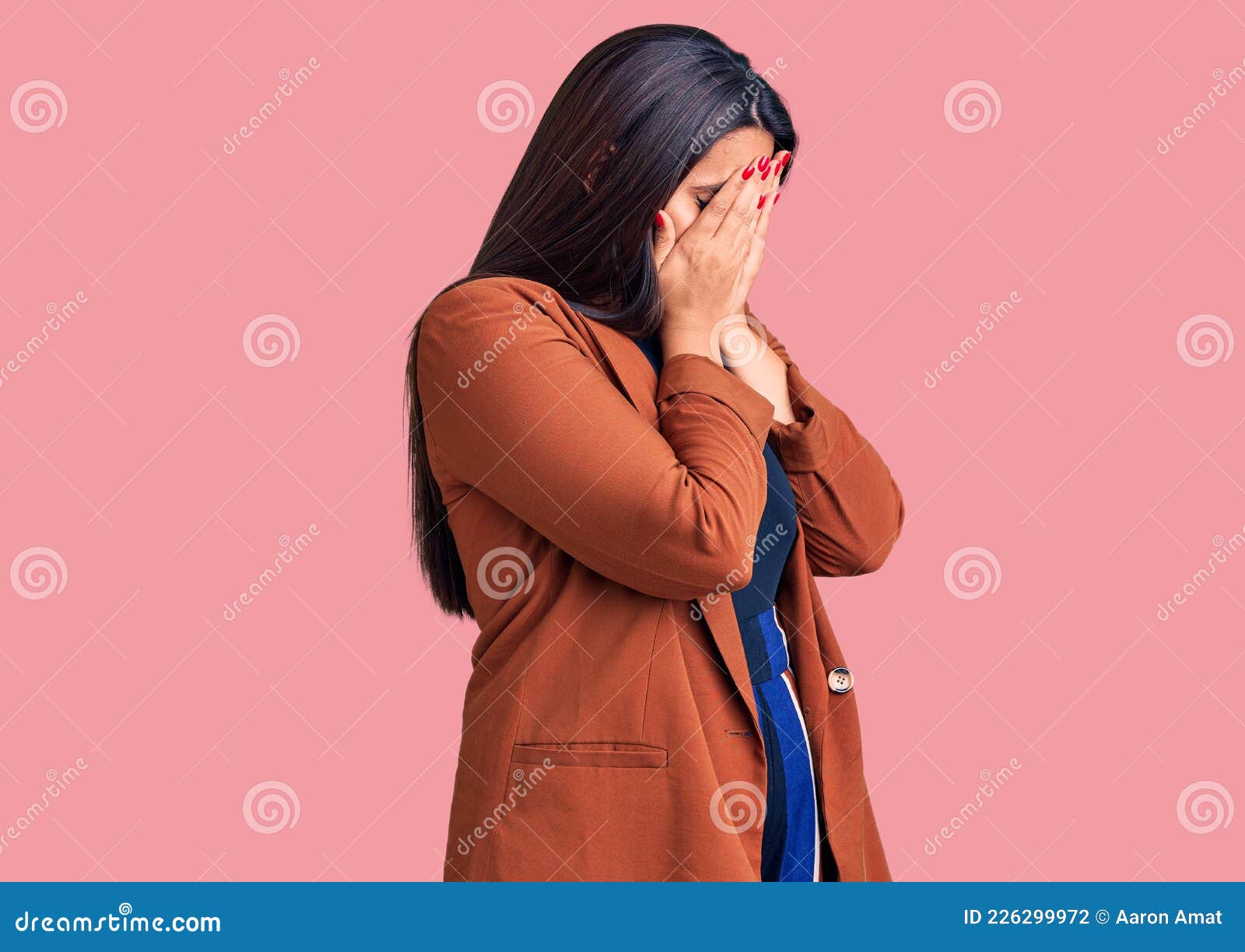 Young Beautiful Brunette Woman Wearing Elegant Clothes With Sad