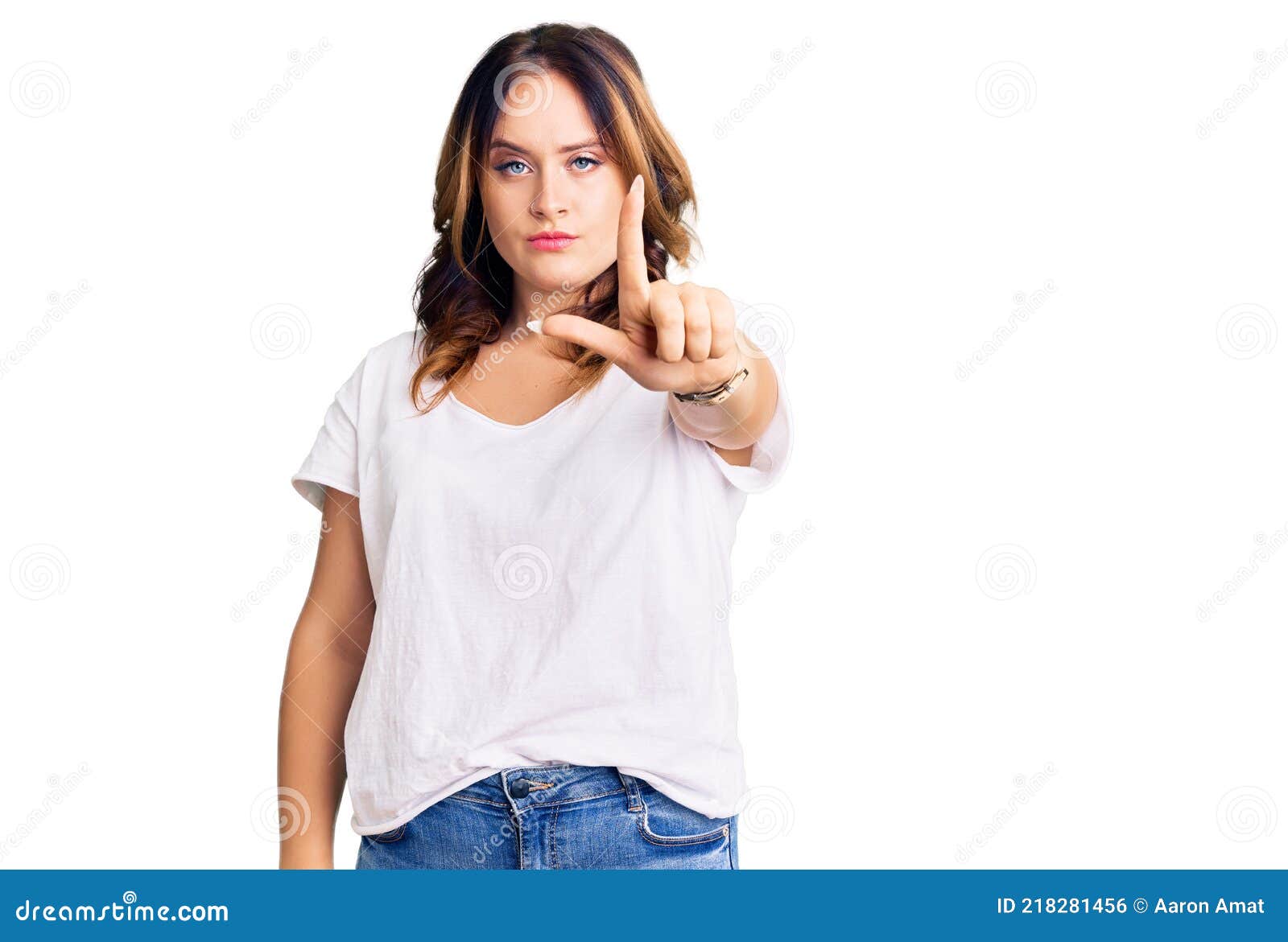 Young Beautiful Caucasian Woman Wearing Casual White Tshirt Pointing