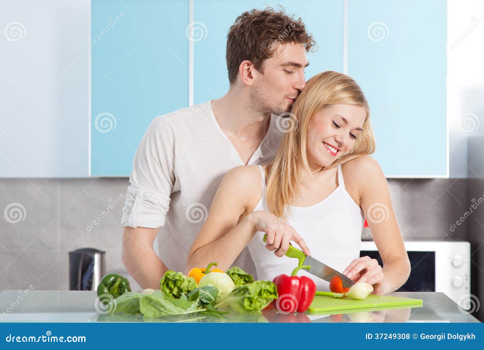 Young Beautiful Couple Cooking at Home Stock Photo - Image of kitchen ...
