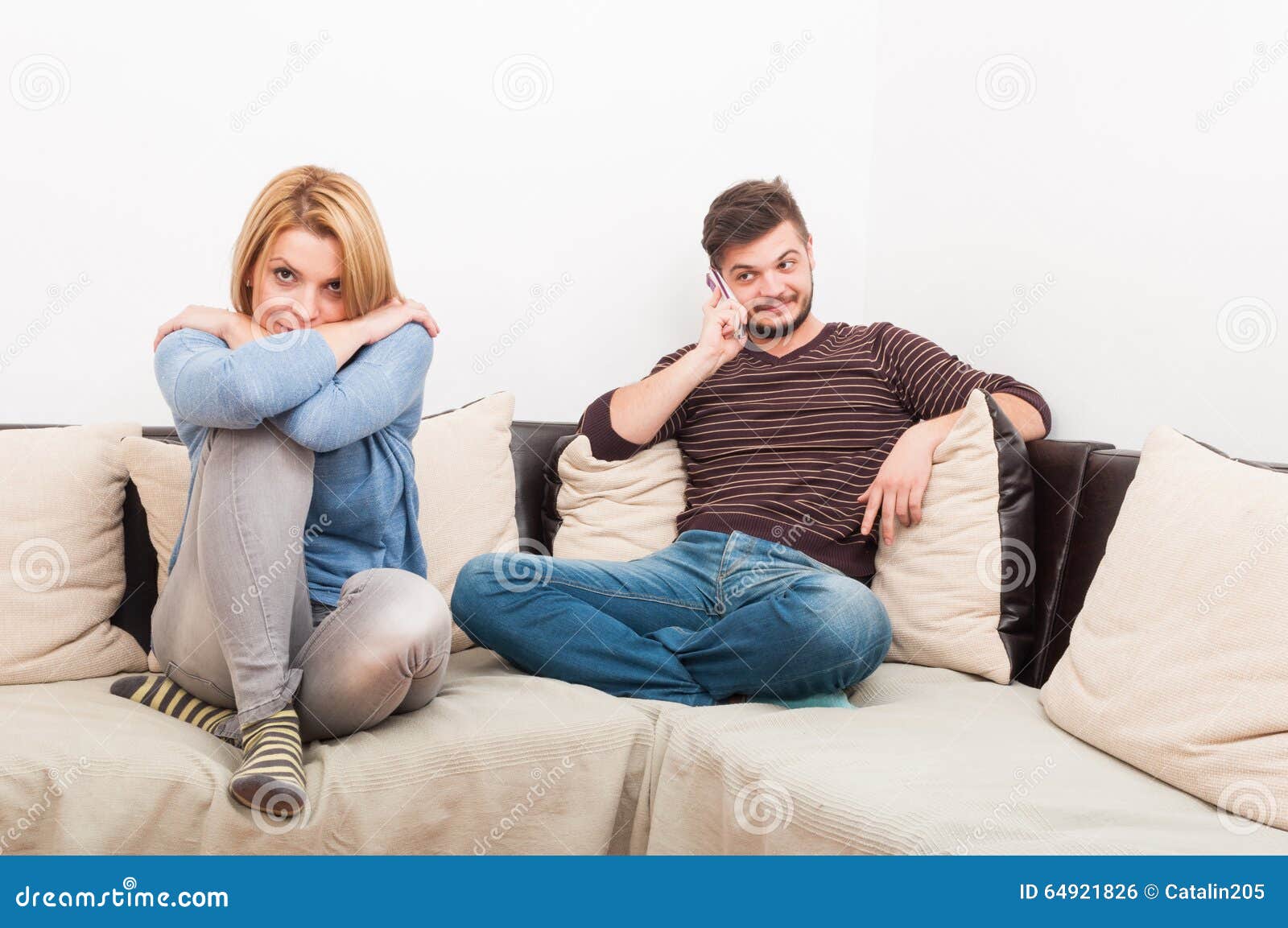 Young Beautiful Couple on Jealousy Concept Stock Photo - Image of phone ...