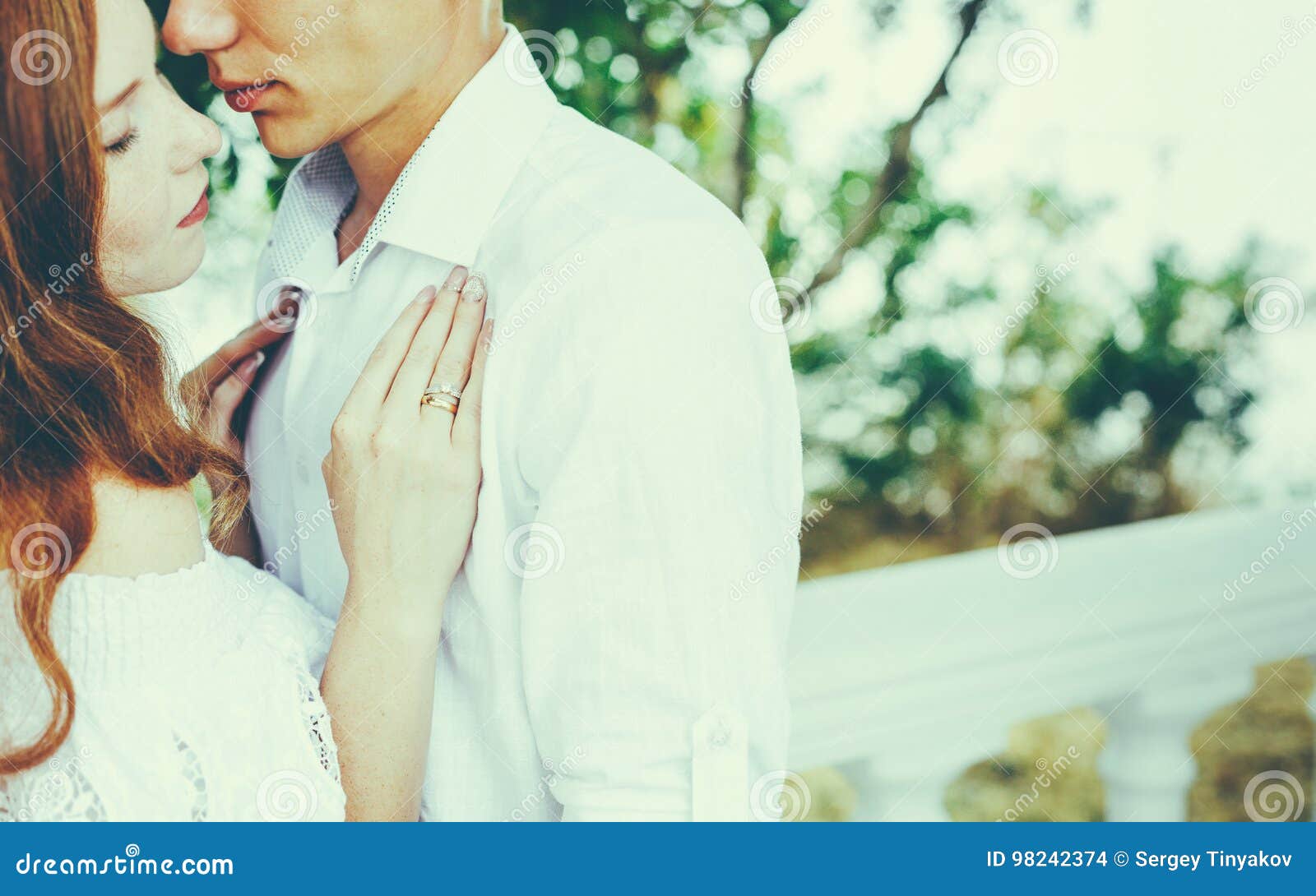 Young Beautiful Couple In Love Hug Each Other In Summer Park Enjoying