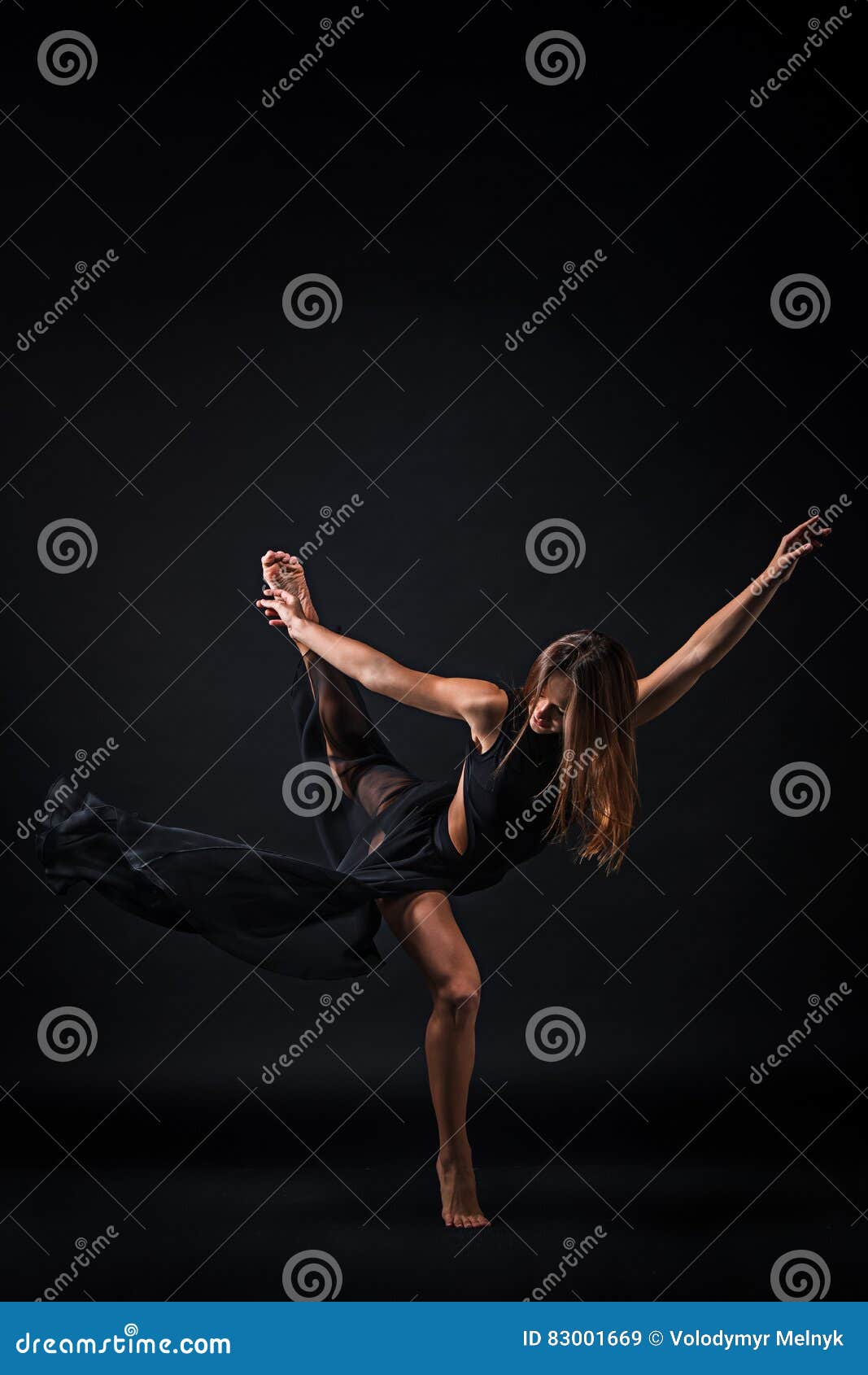 Young Beautiful Dancer in Beige Dress Dancing on Black Background Stock ...