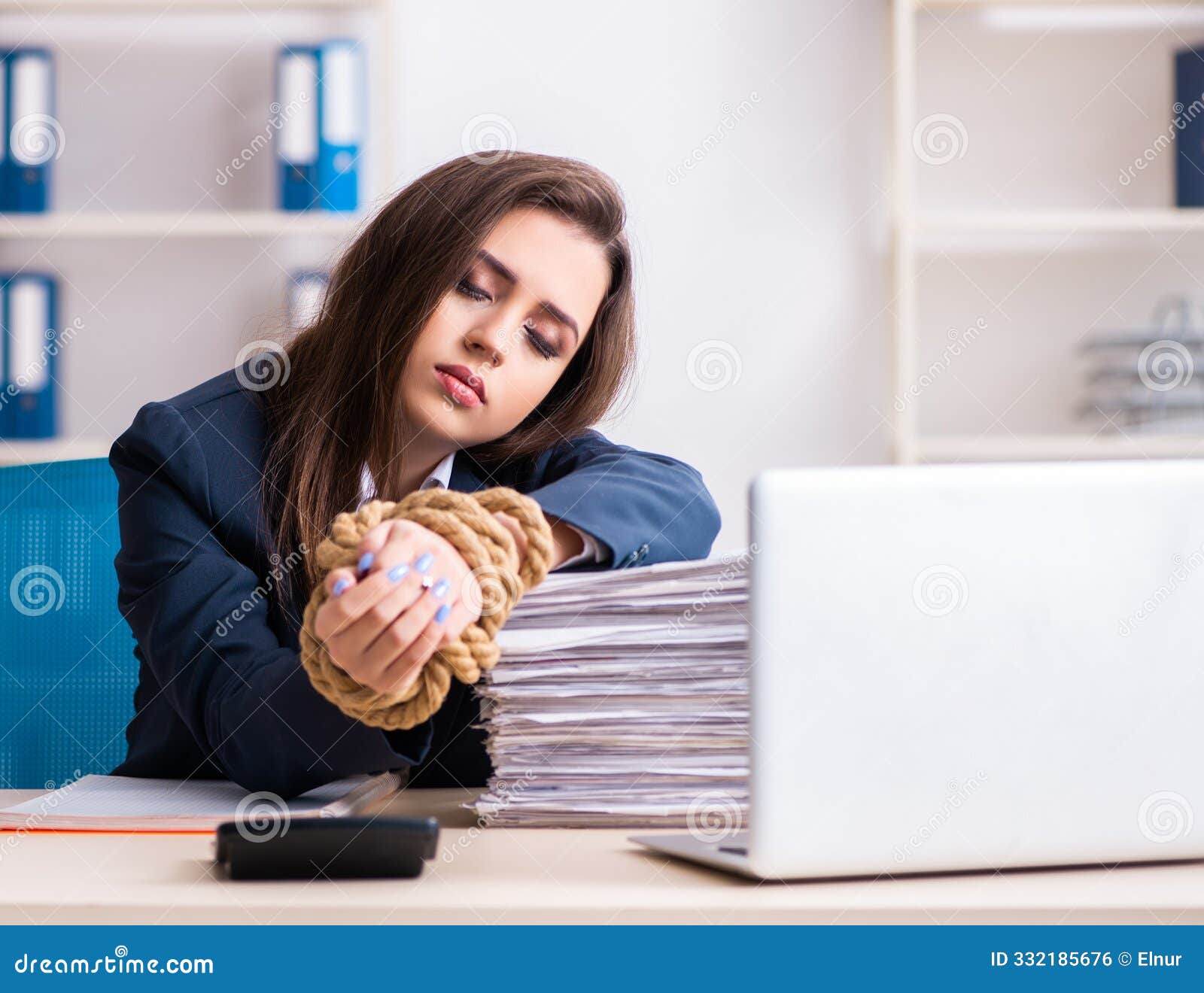 Young Beautiful Employee Tied Up with Rope in the Office Stock Photo ...