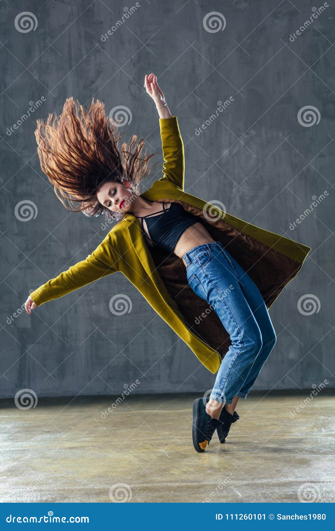 Young Beautiful Female Dancer is Posing in the Studio Stock Image ...